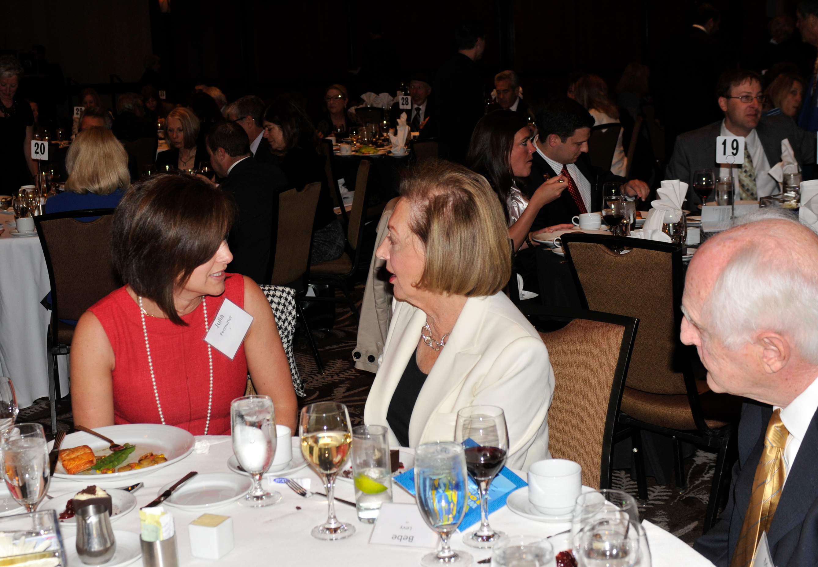 Guests chatting during dinner
