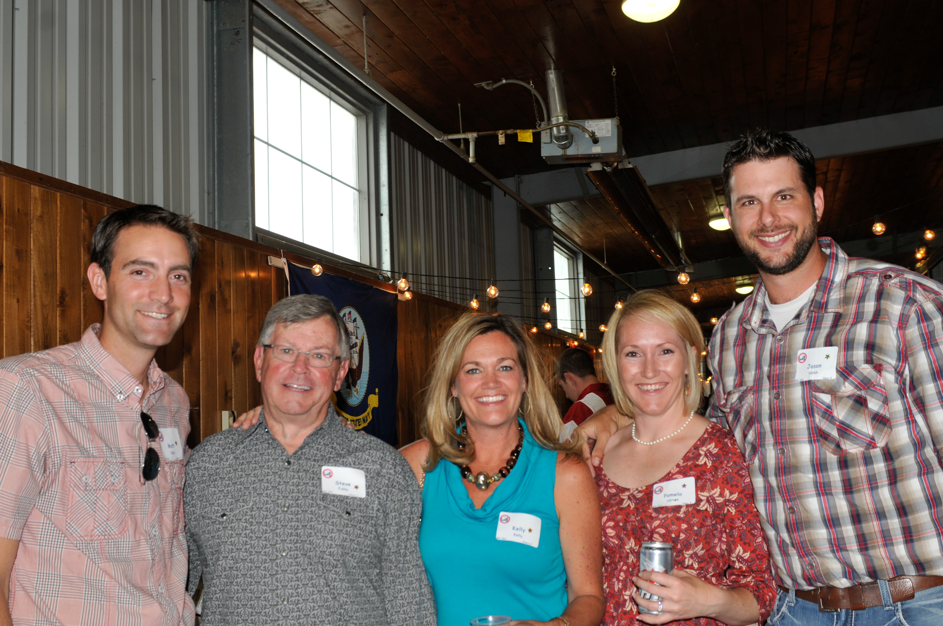 Matt Kelly, left, Steve Fallin, Kelly Kelly, Pam and Jason Hirsch