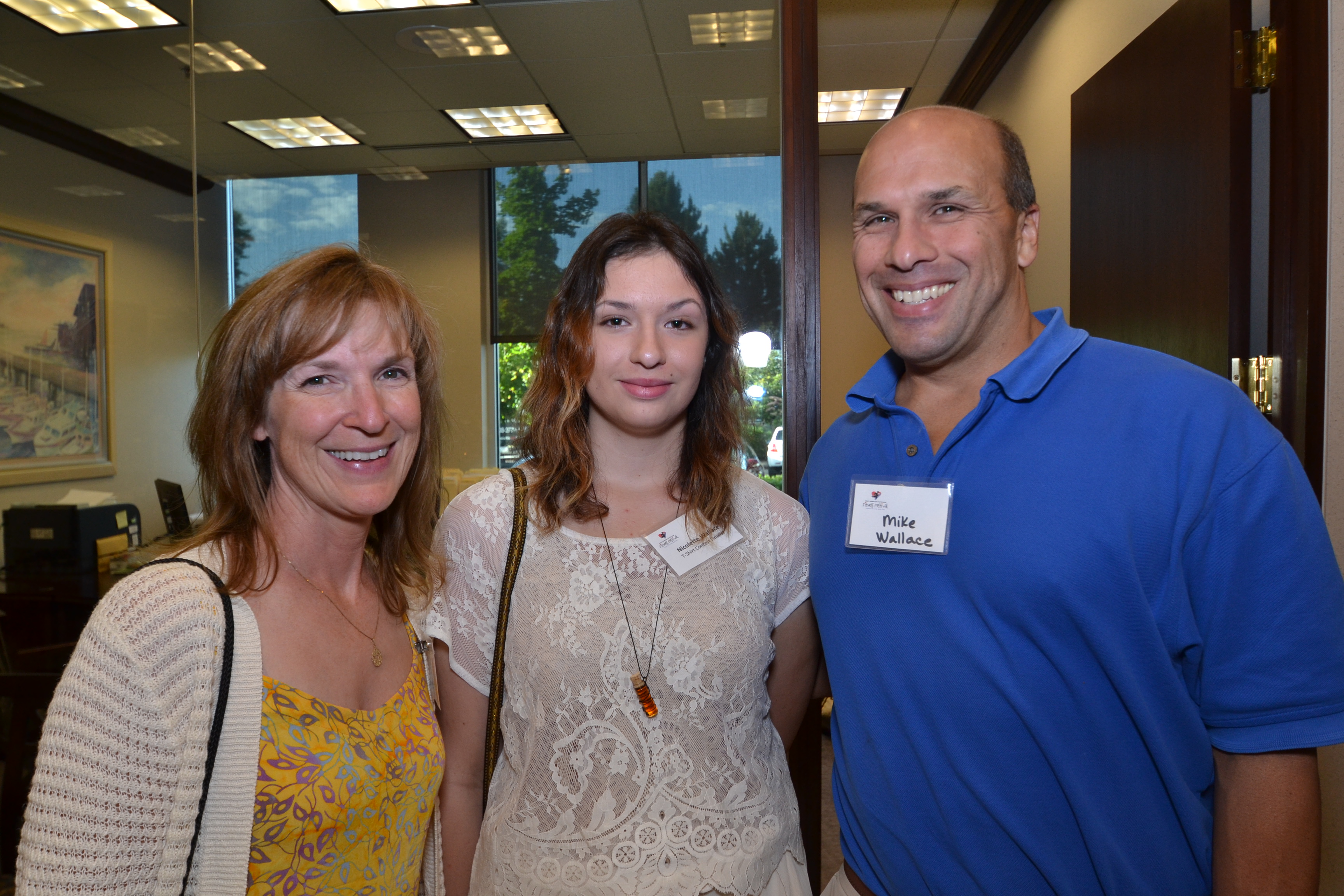 Patti Wallace, T-shirt design finalist Nicolette Wallace and Mike Wallace