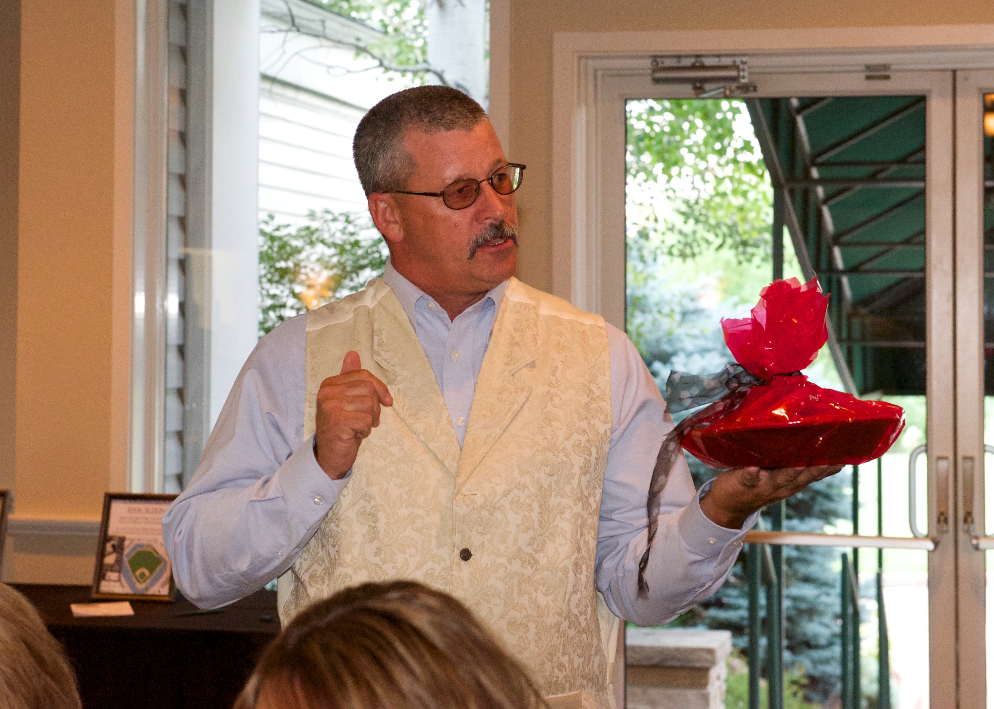 Jeff Sweeney takes bids on the pie