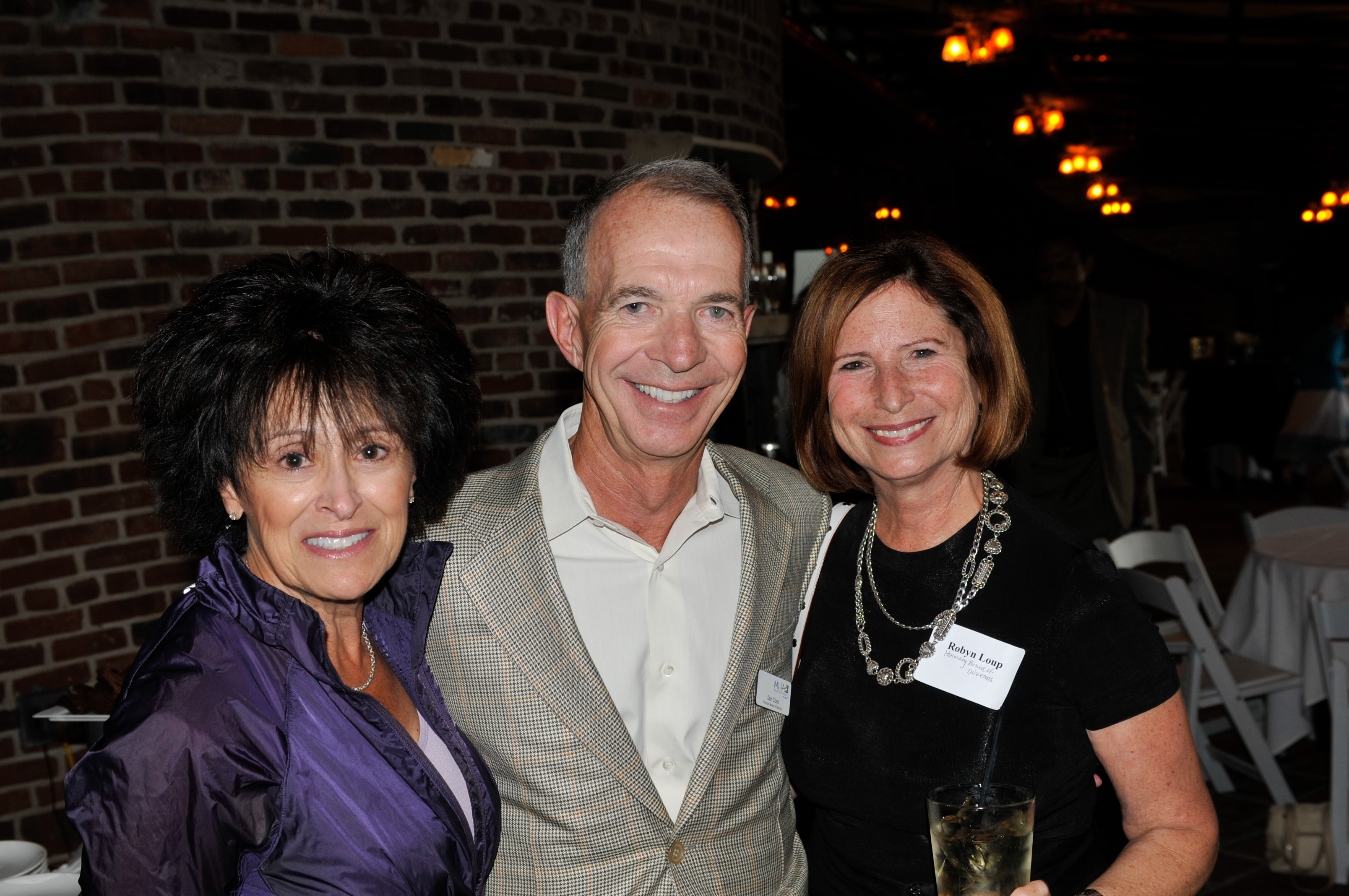 Event Co-Chairs Patty and Don Cook, left, with Robyn Loup