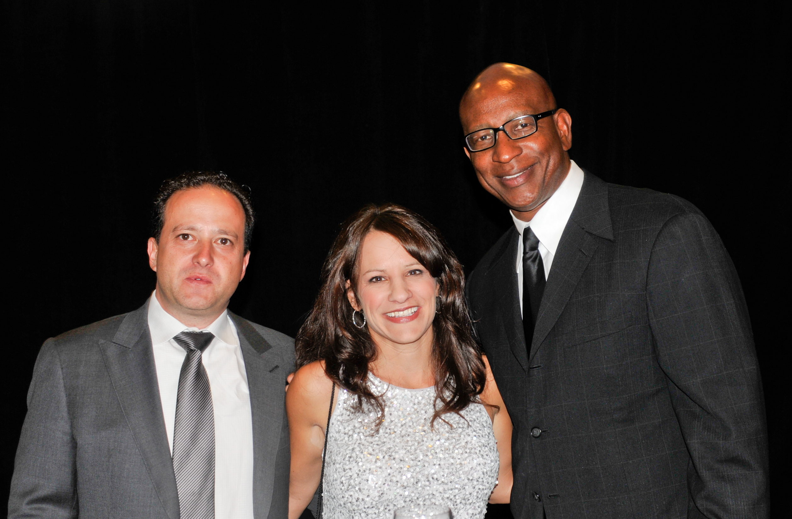 Ben and Lara Litein, left, with NFL star Eric Dickerson
