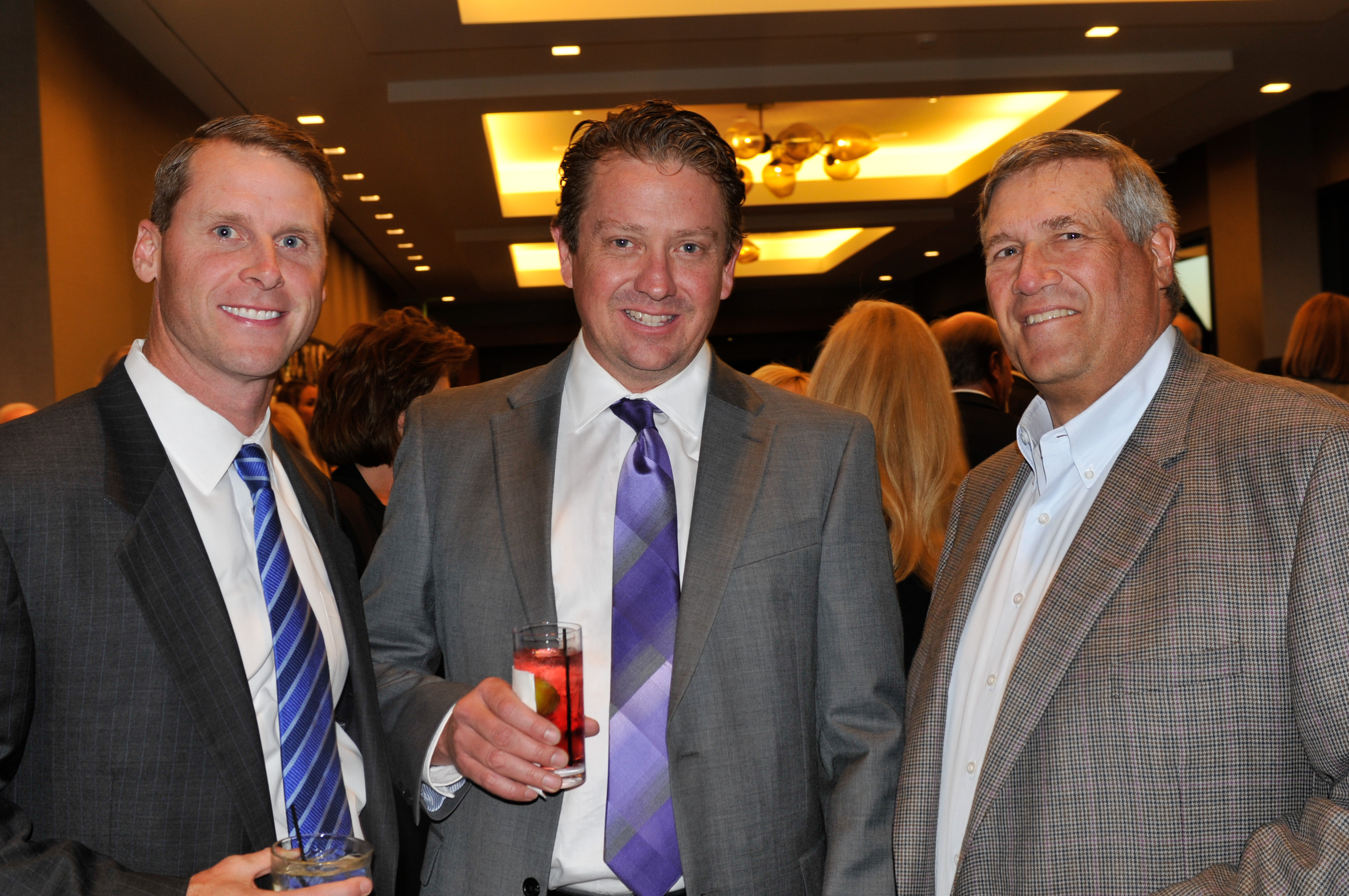 Scott Young, left, Brit Schabacker and Wayne Gardenswartz