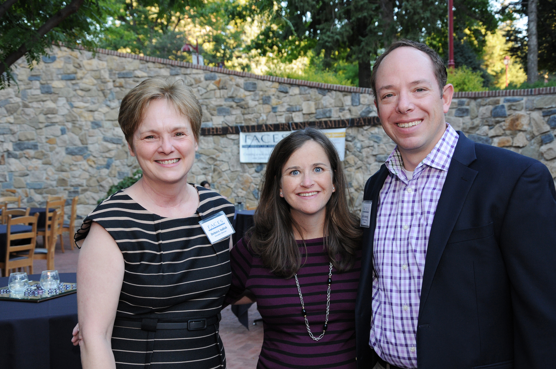 Debora Judish, executive director at FACES, and Matt and Claire Gehring