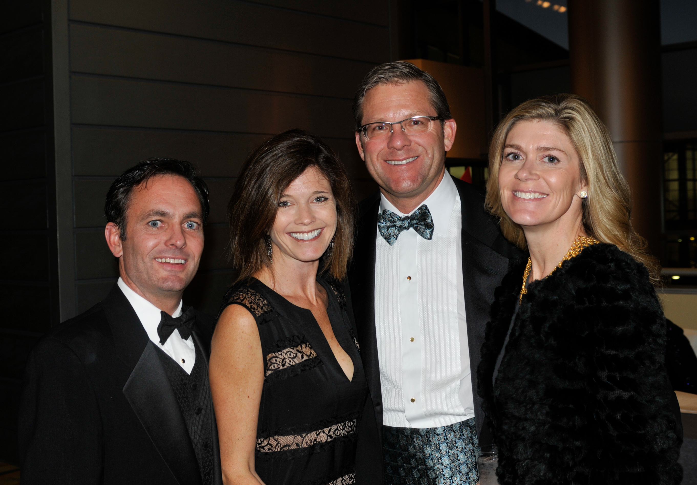 Kyle and Sally Hybl, left, with Buck and Janelle Blessing