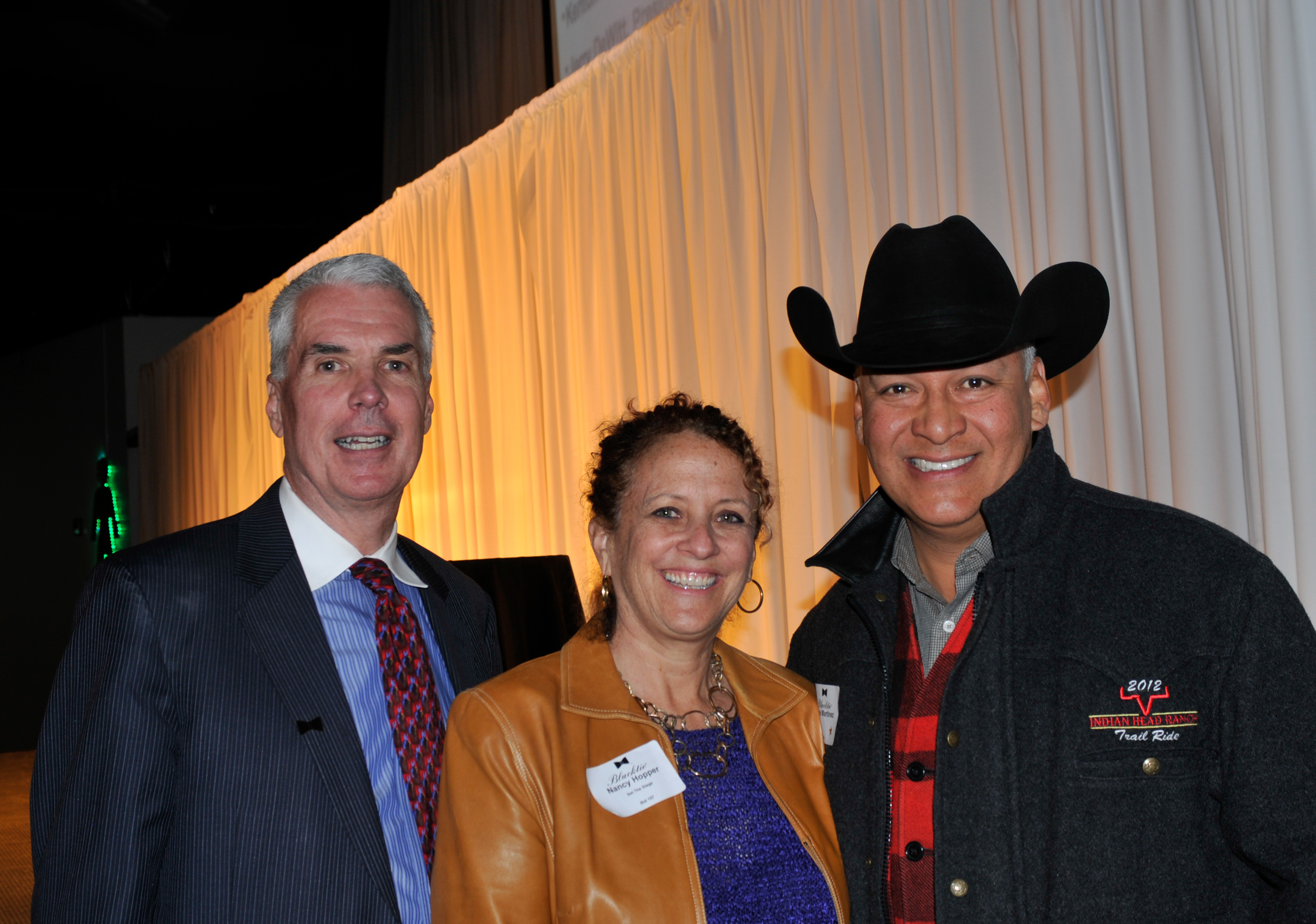 Kenton Kuhn, left, his wife Nancy Hopper and Pete Martinez