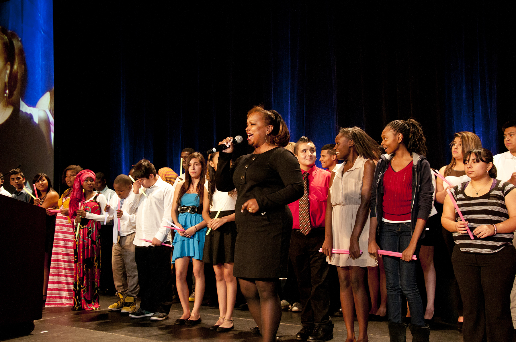 Mary Louise Lee sings the song "Just Stand up"