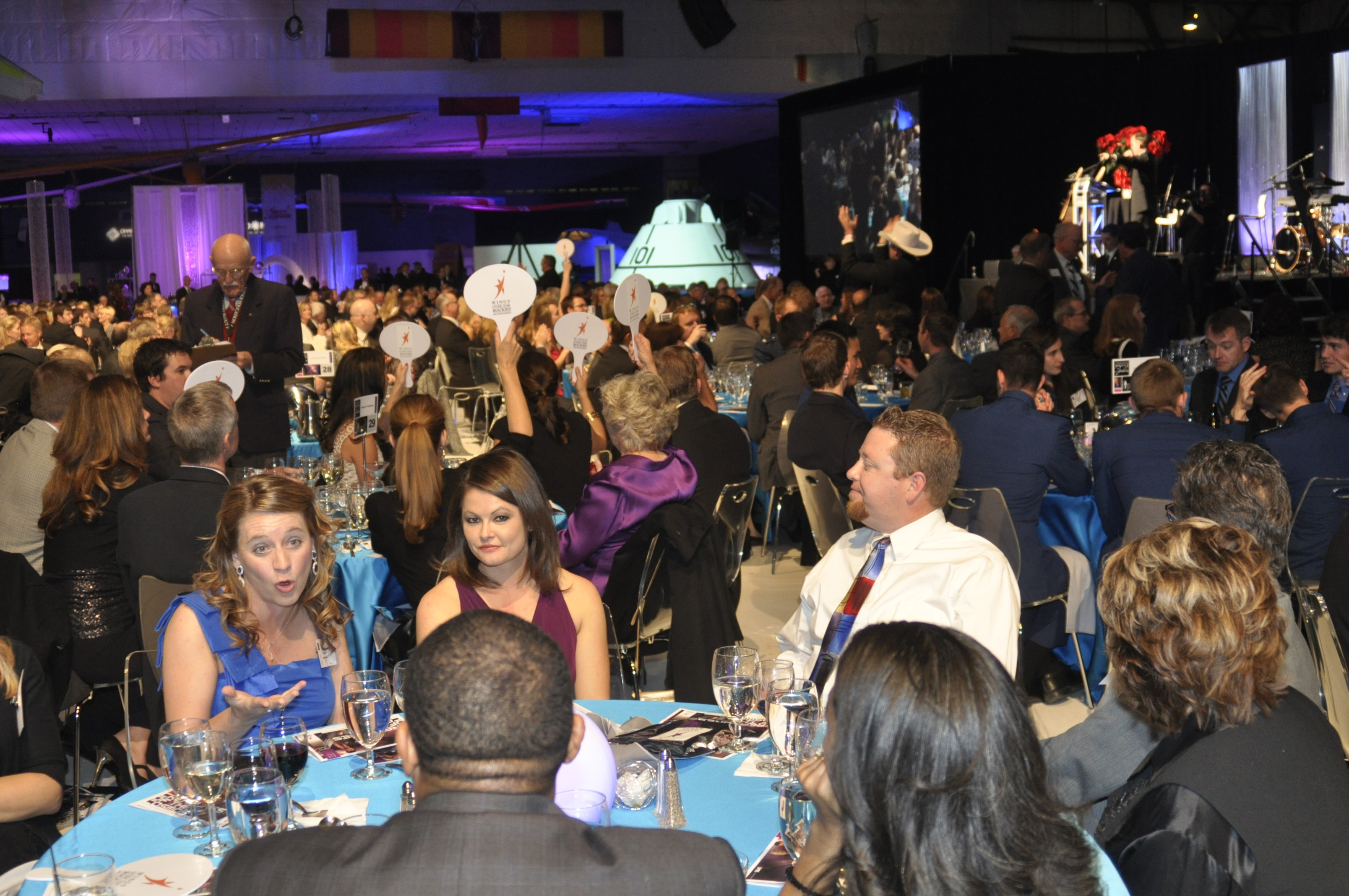 Guests enjoy the paddle auction