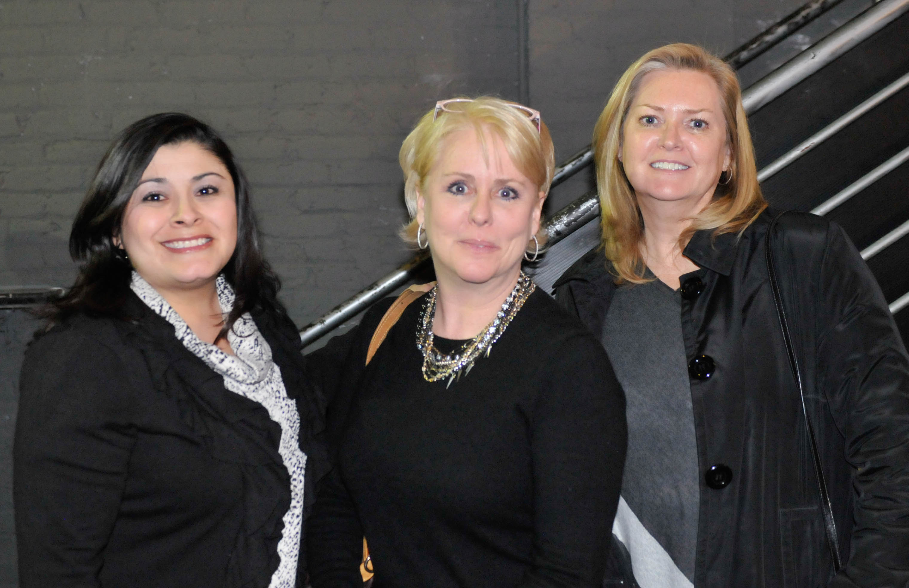 Tanisha Guerra, left, Peach Carr and Julie Joy