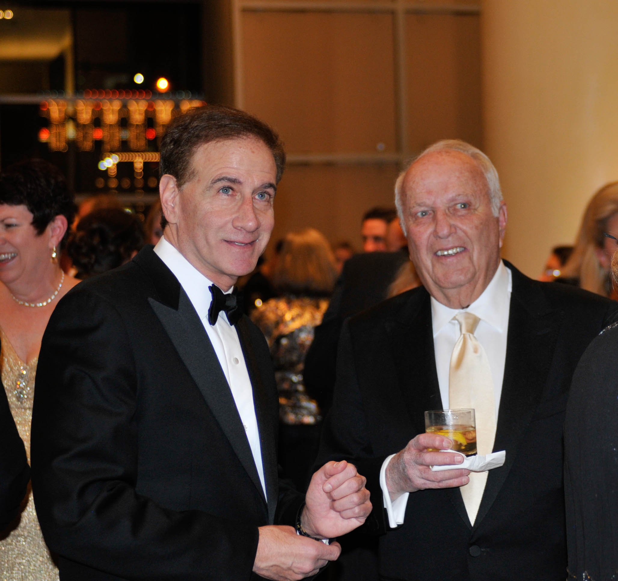 Dr. Michael Salem, left, and Dick Robinson compare notes during the ...