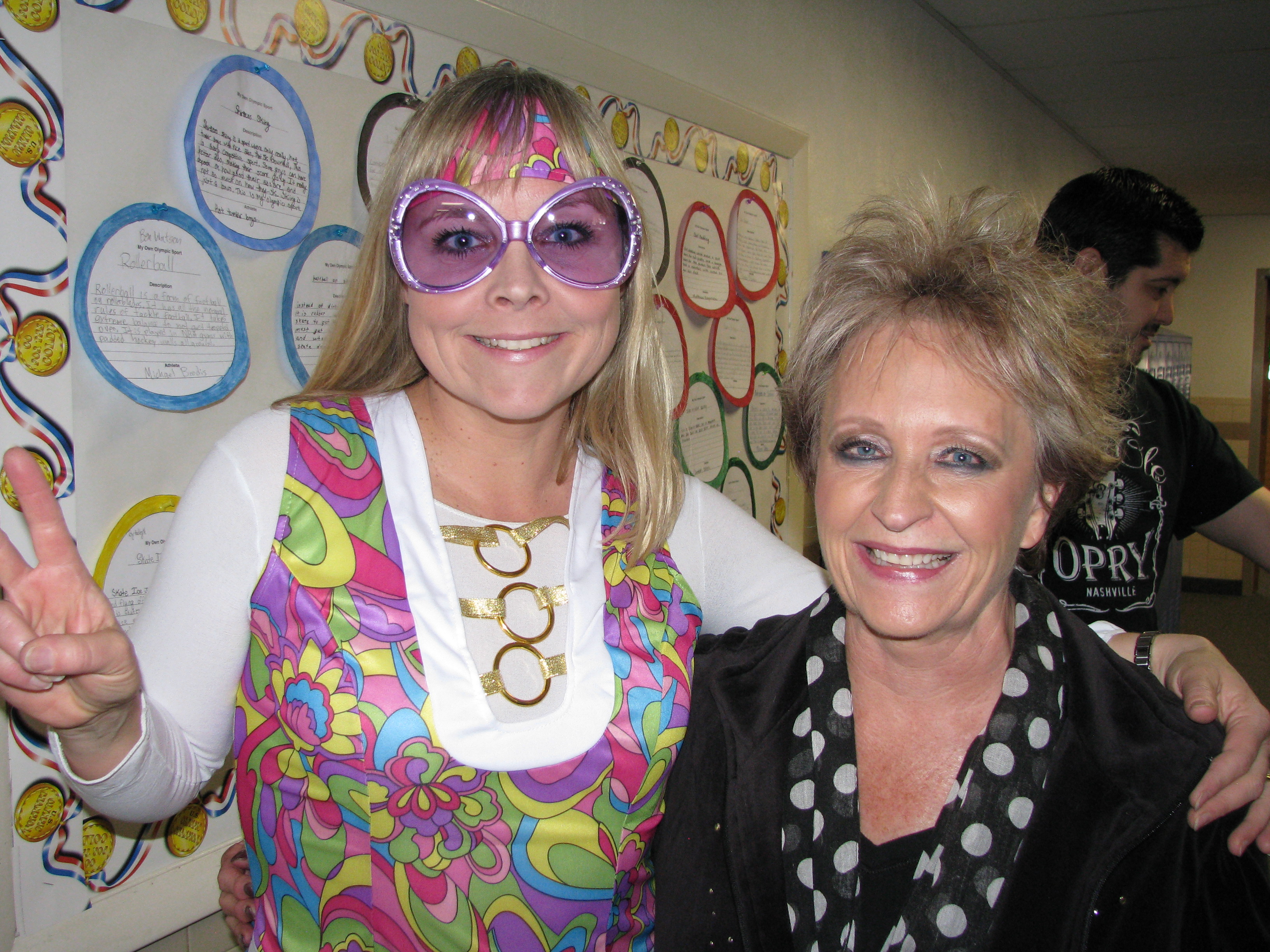 Katrina Dean, left, sports her hip 70s shades and smiles with Gloria Cross