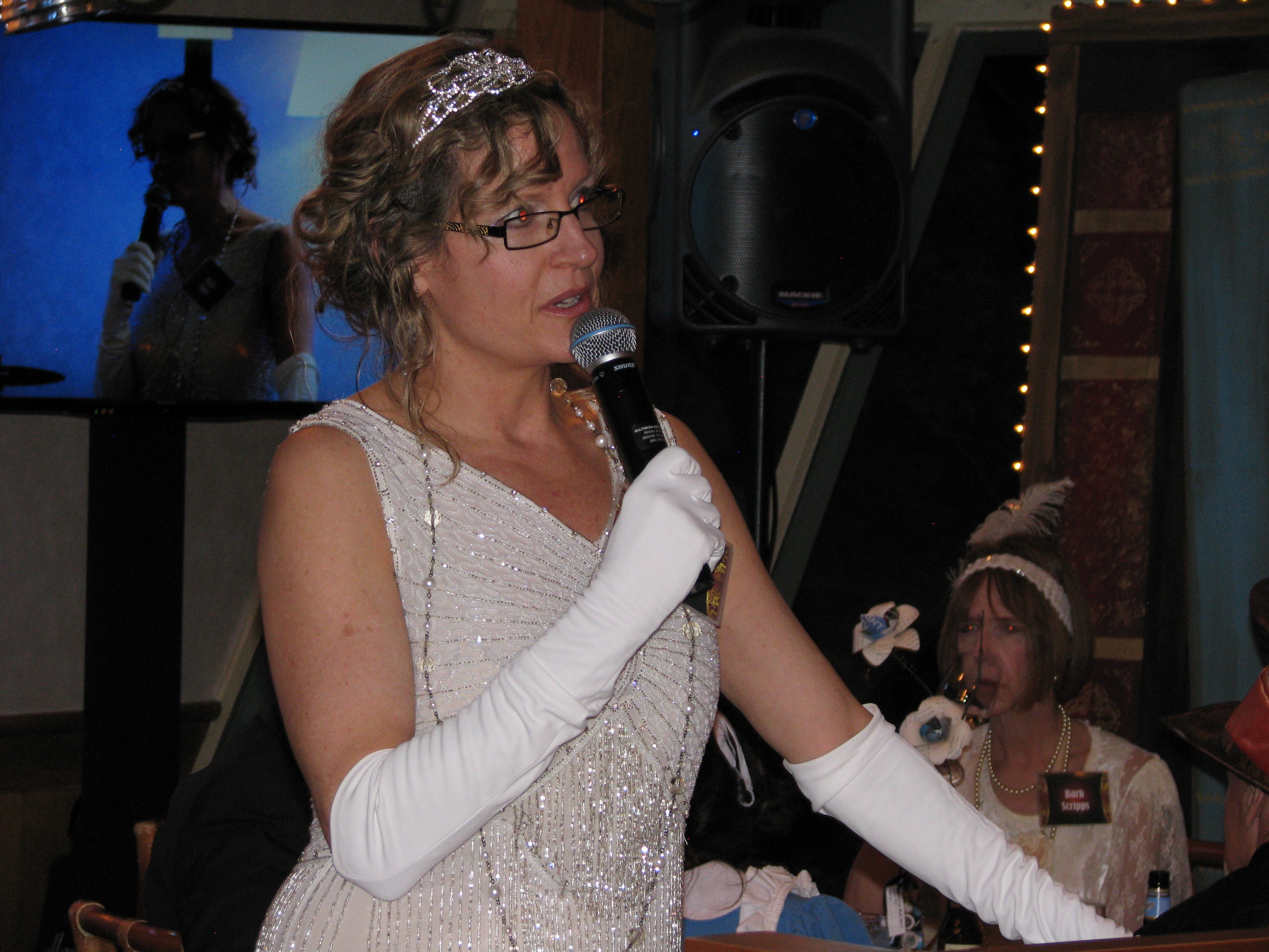 Kathy Engel welcomes the crowd