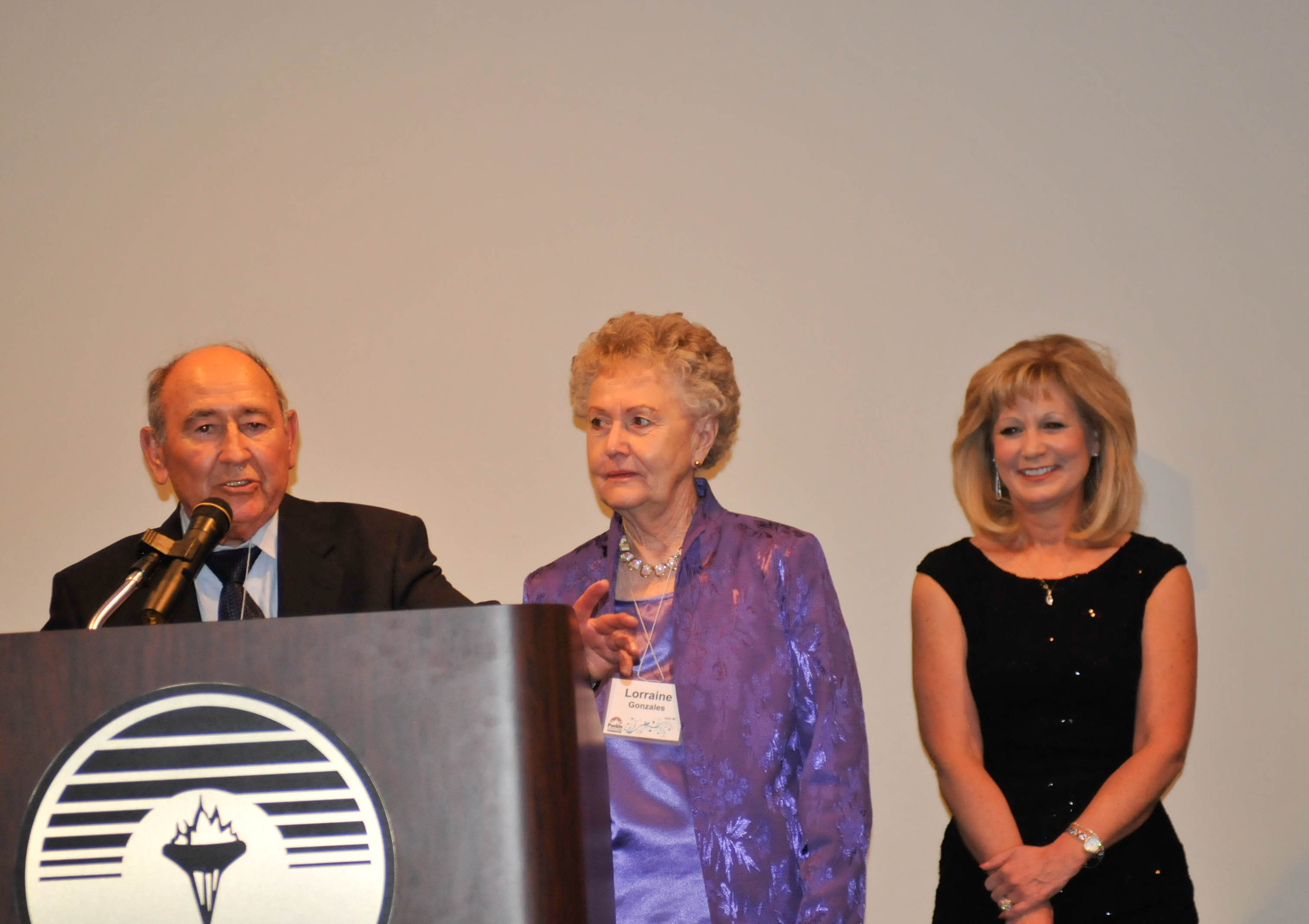 Art and Lorraine Gonzales and Patty Erjavec on stage