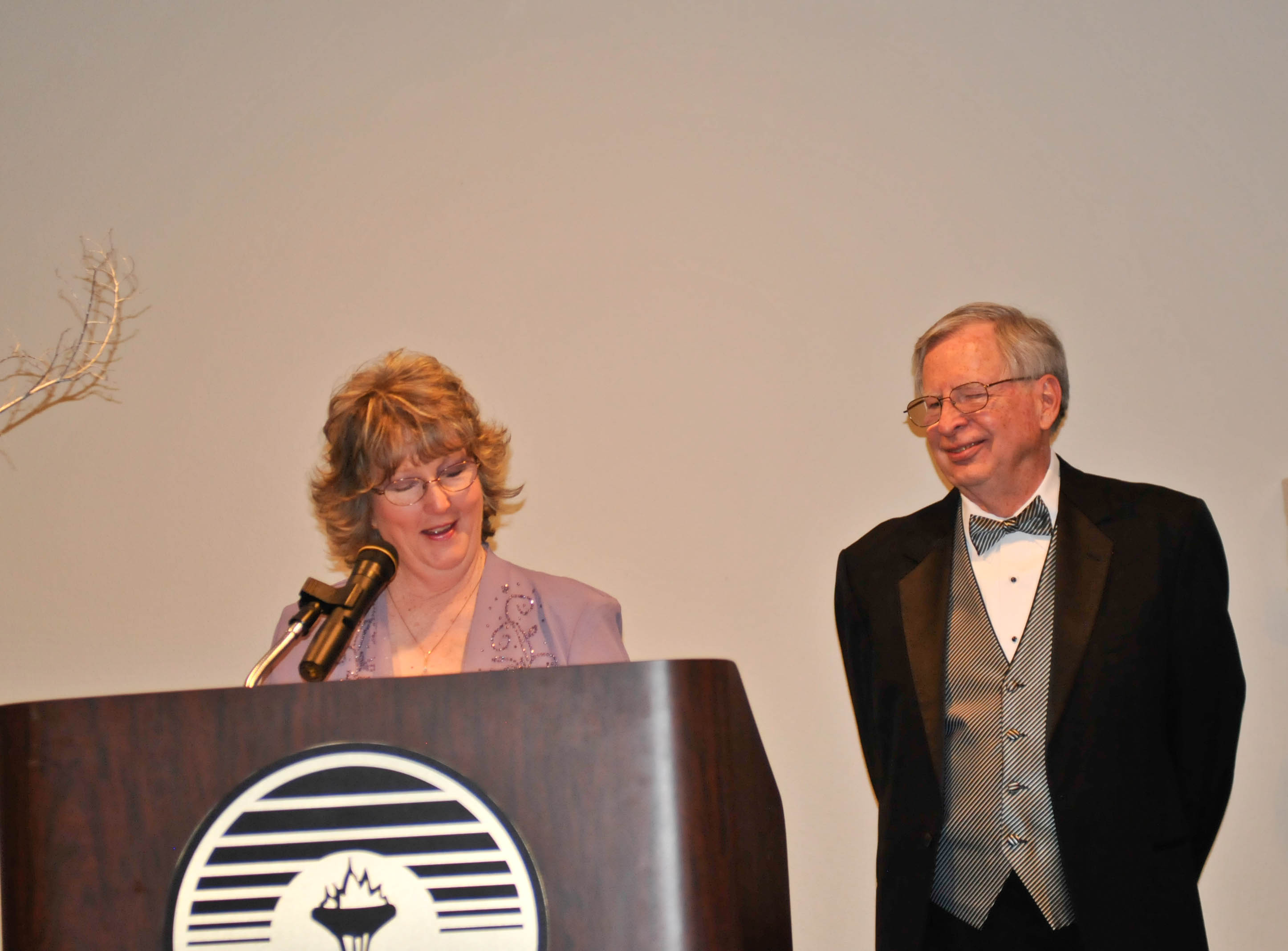 Paulette Stuart says a few words as Jim Stuart looks on