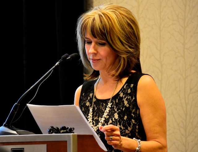 Kim Christiansen introduces the awards portion of the evening.