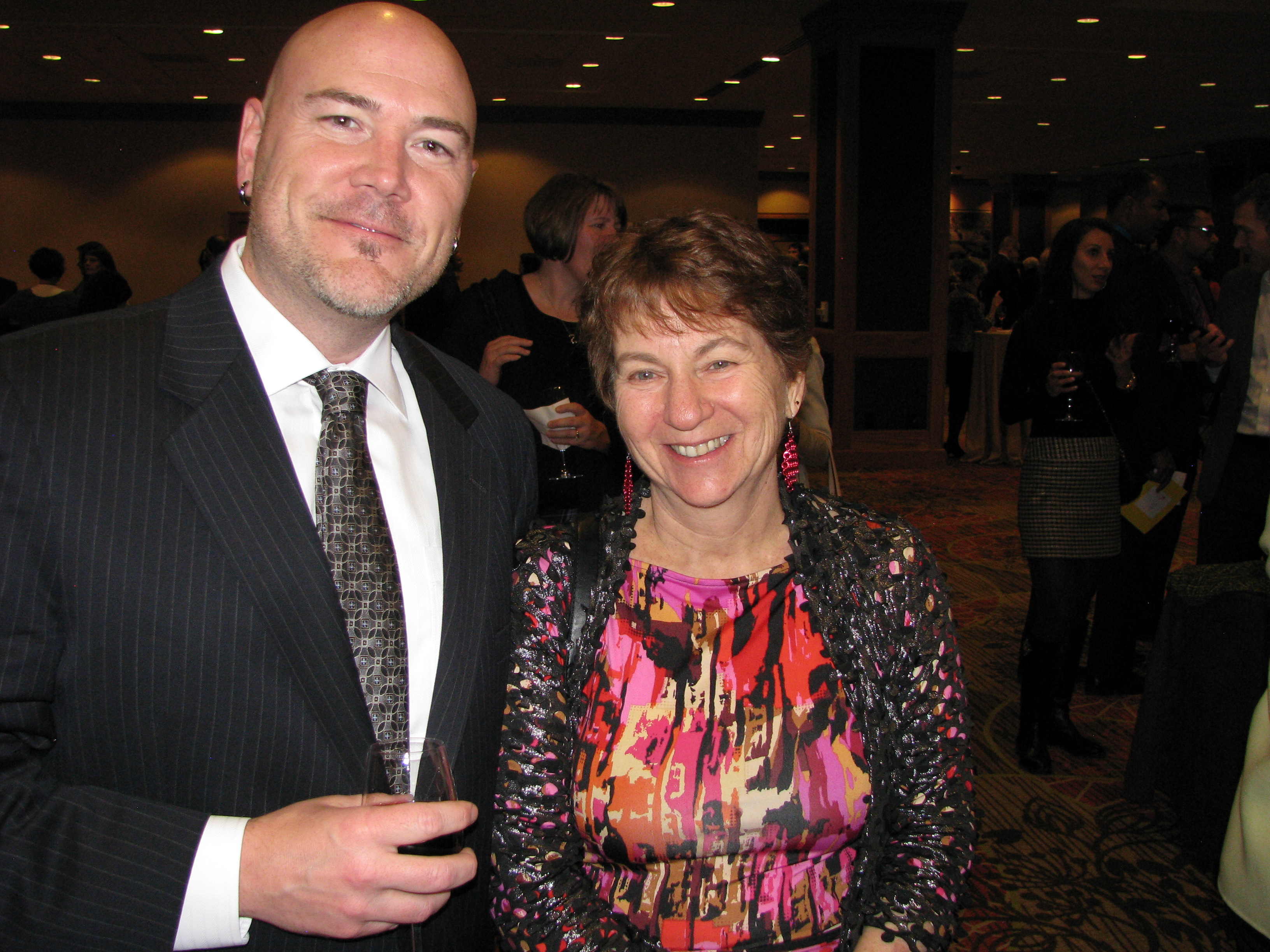 Dr. Sean Reed and Dr. Barbara Morris catch up before sitting down to dinner