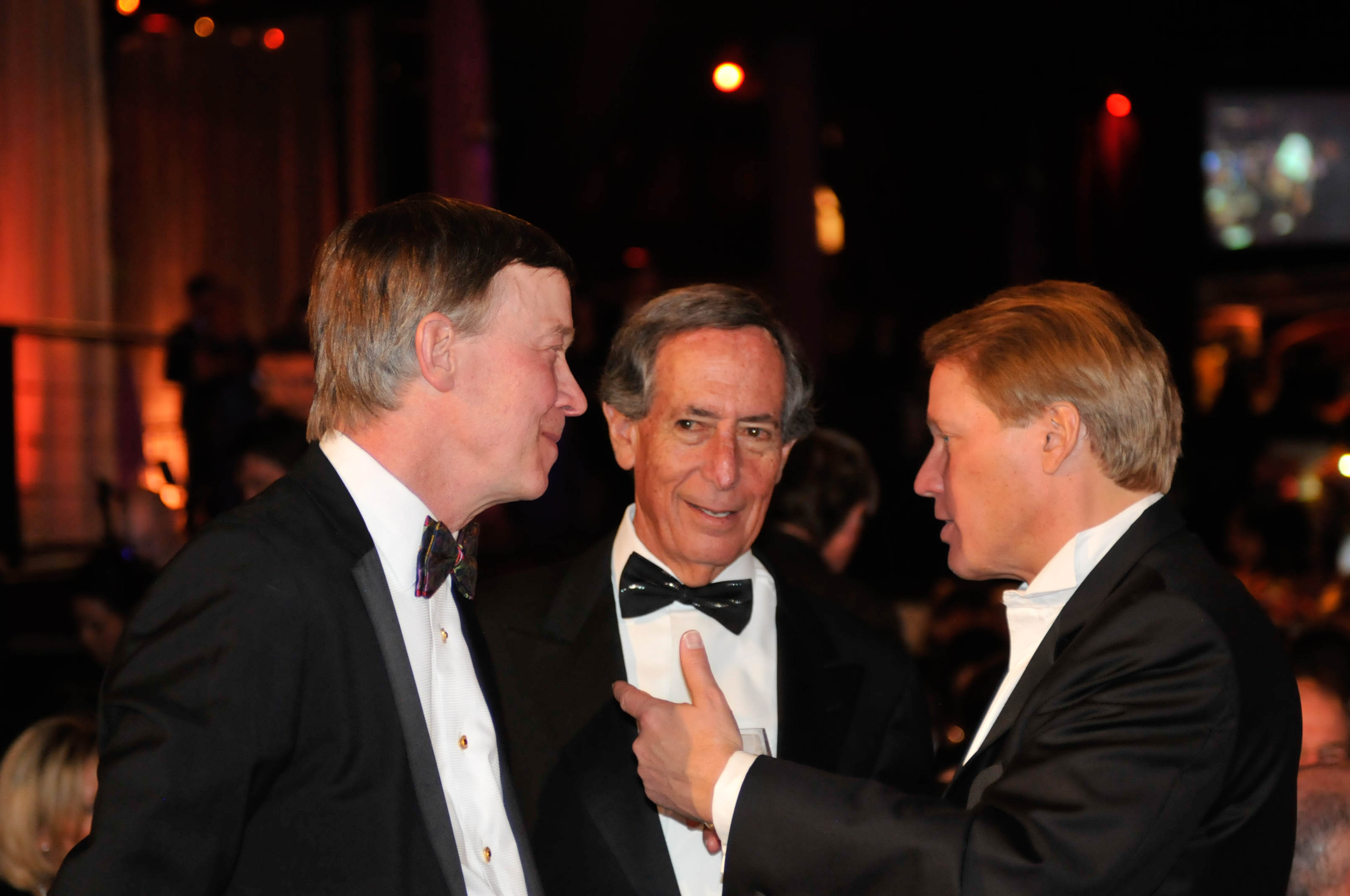 Governor John Hickenlooper, left, Steve Farber and Kent Thiry