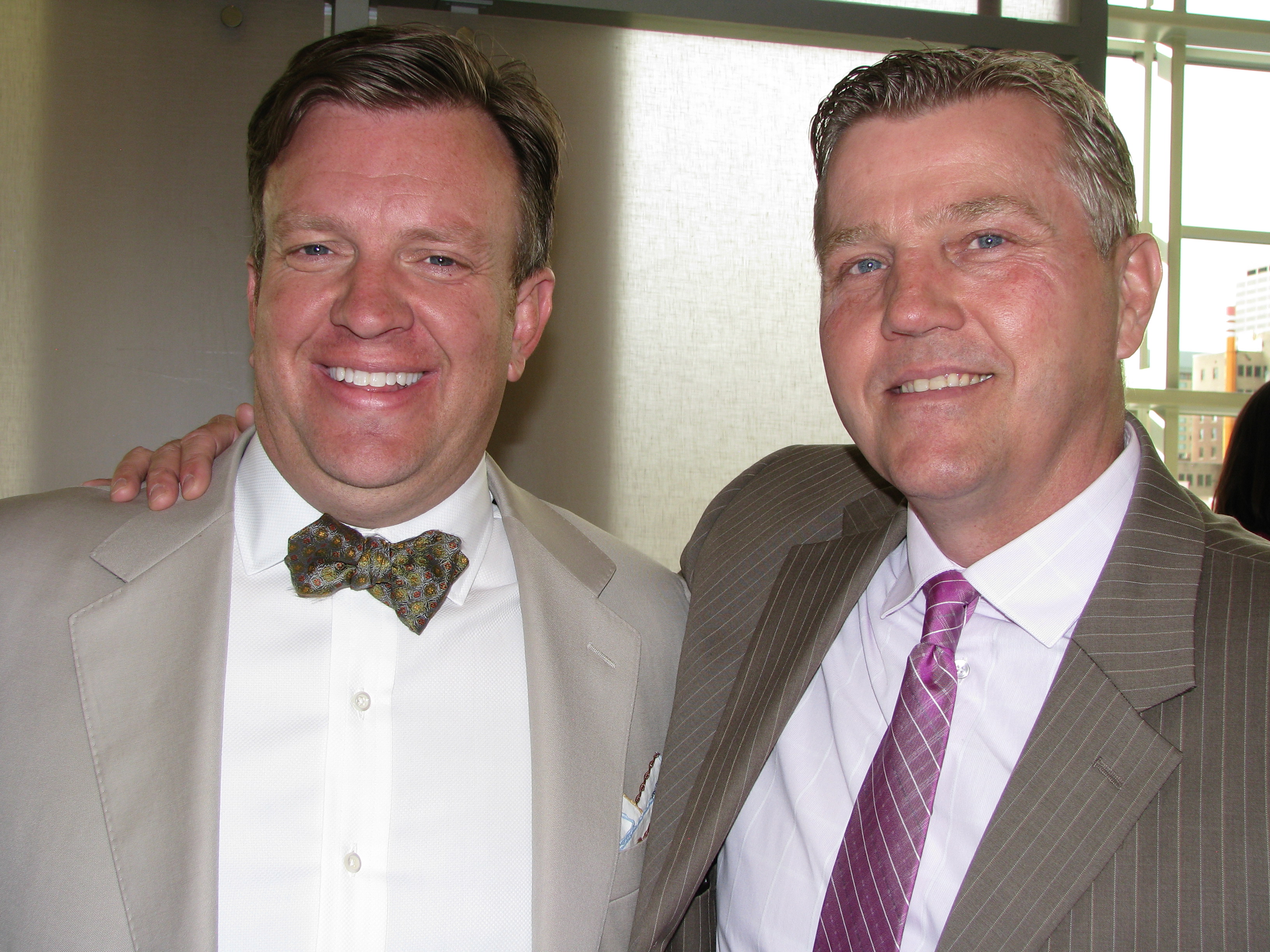 Andy Boian, left, takes a moment for a photo with Phil Soderborg