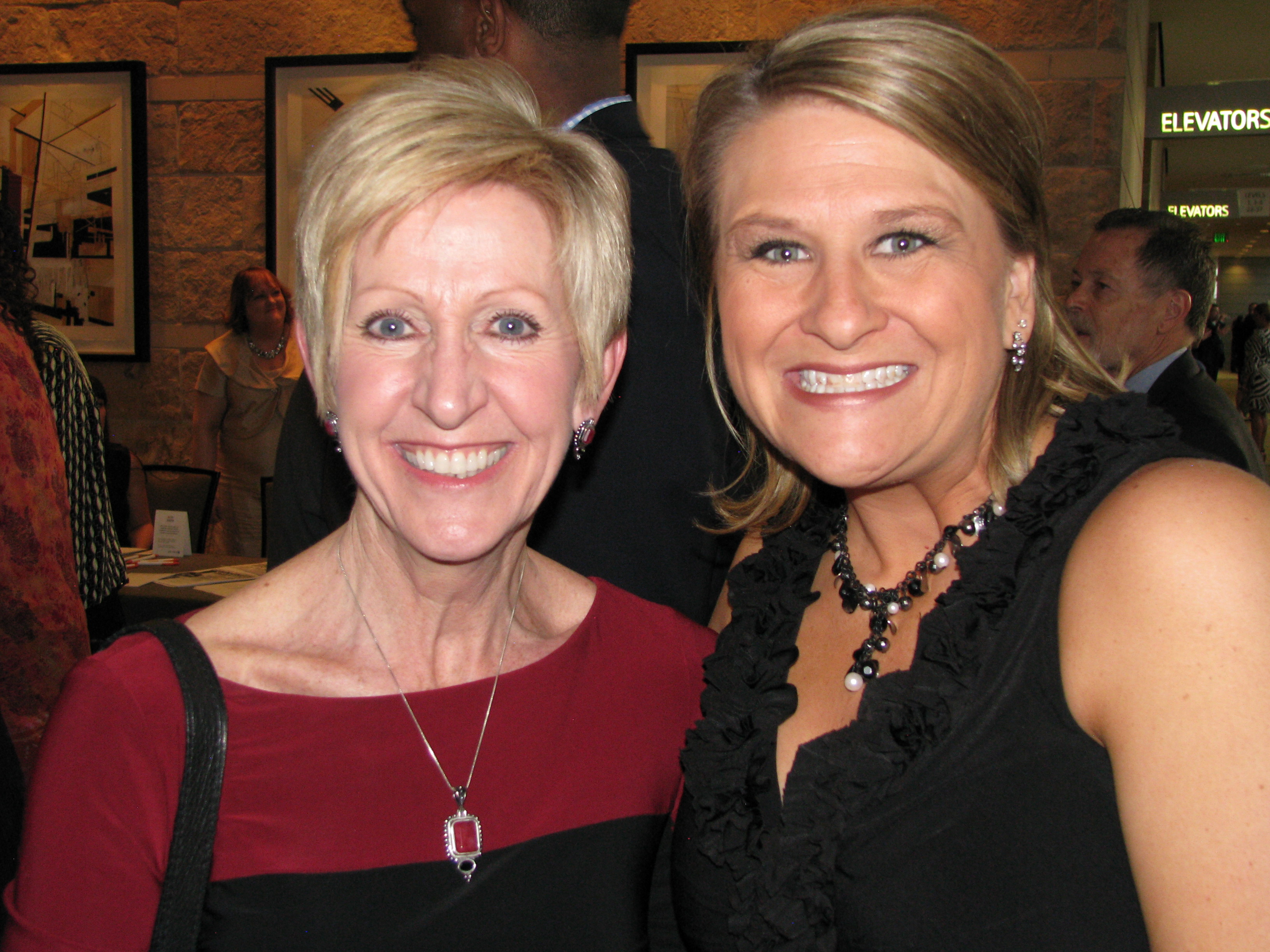 Nora Flood, left, and Shannon Fitzgerald connect at Achieve