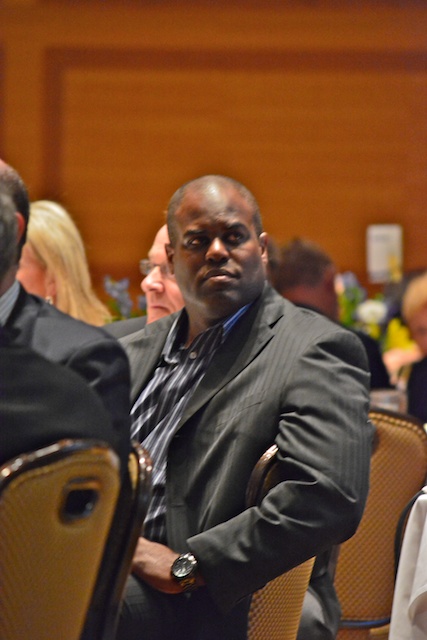 Reggie Rivers listens to the presentation.