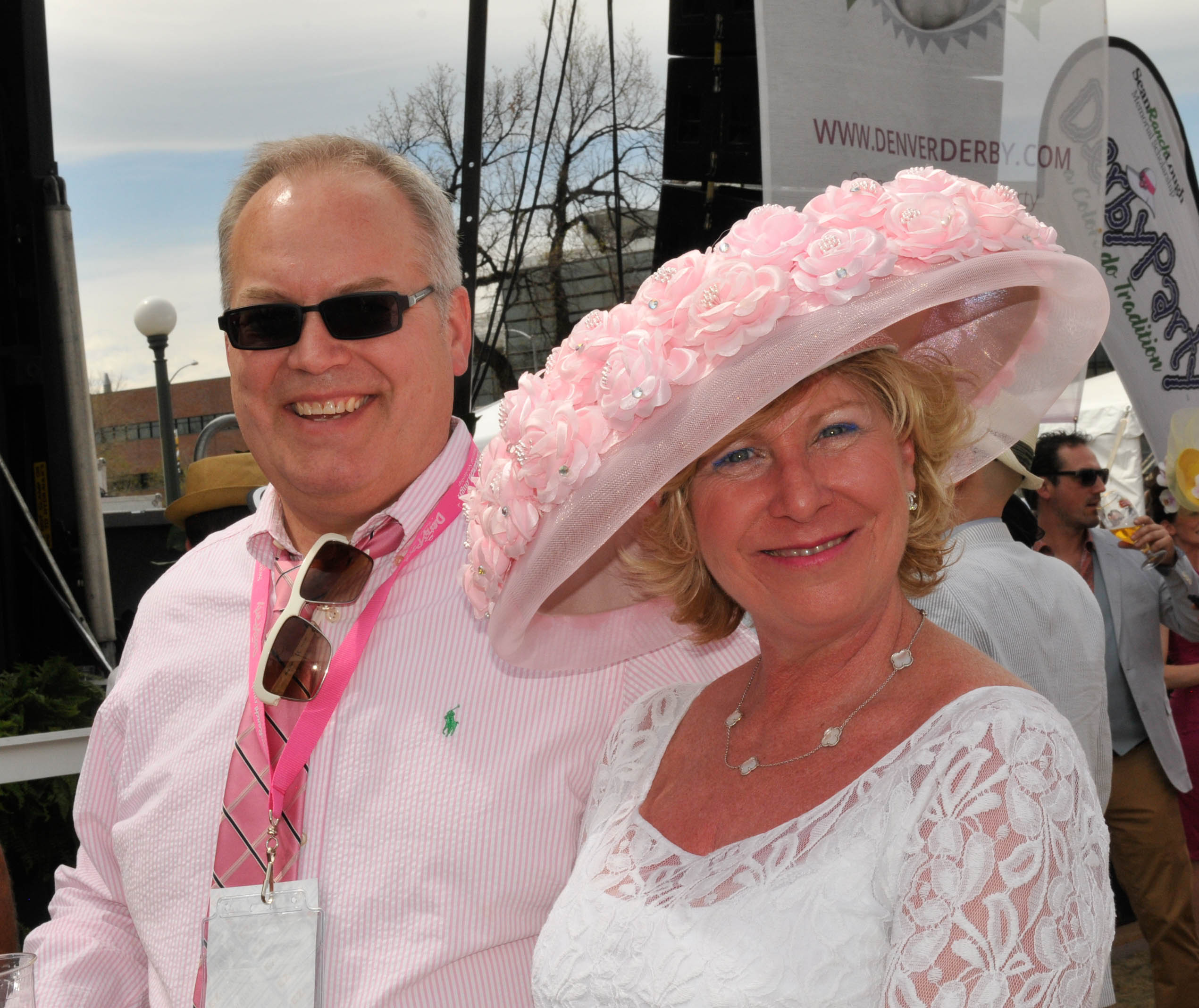 Rick and Kerry Ninneman--she is wearing a hat that is made of roses ...