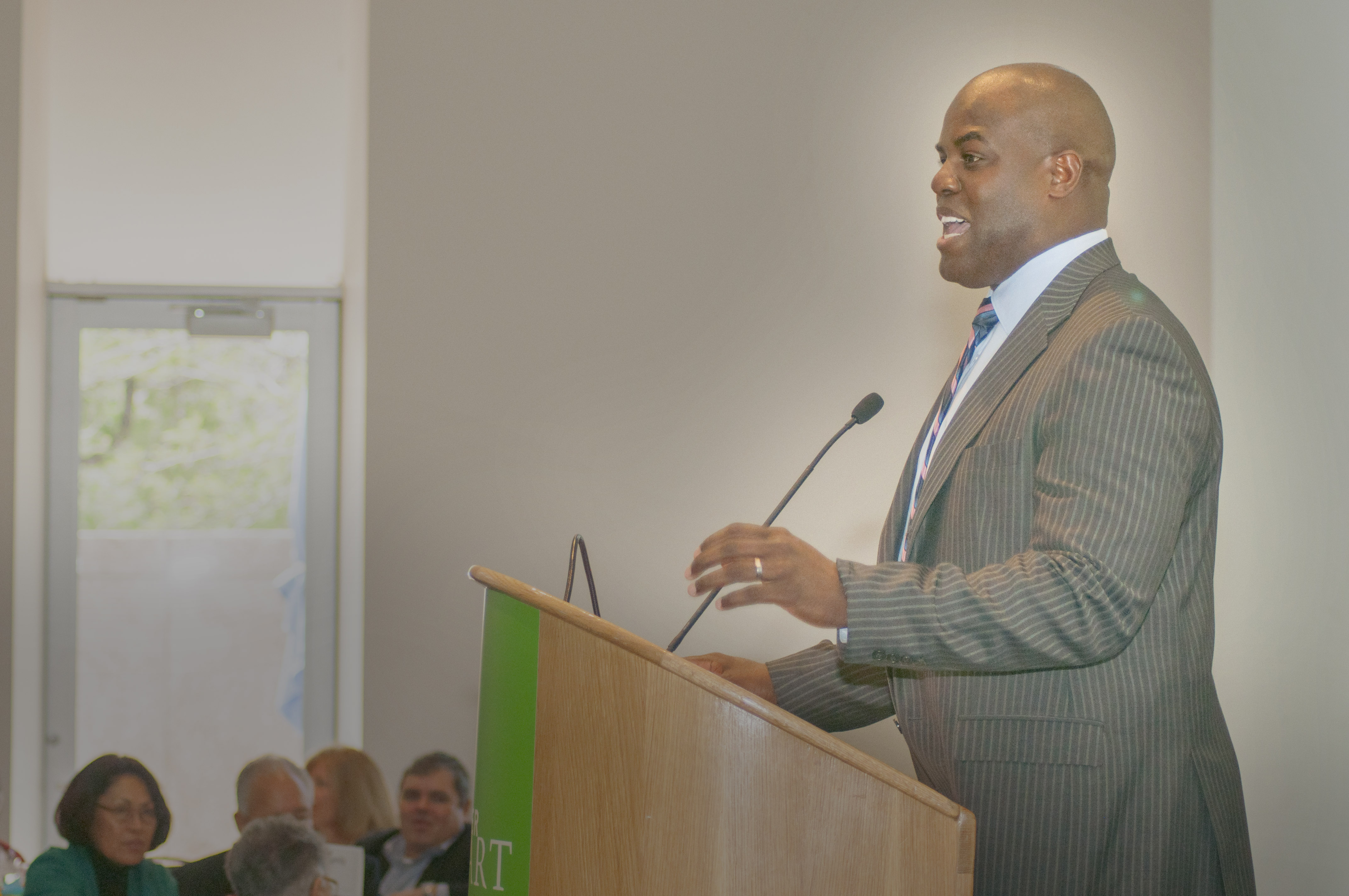 Former Denver Bronco Reggie Rivers leads the live auction