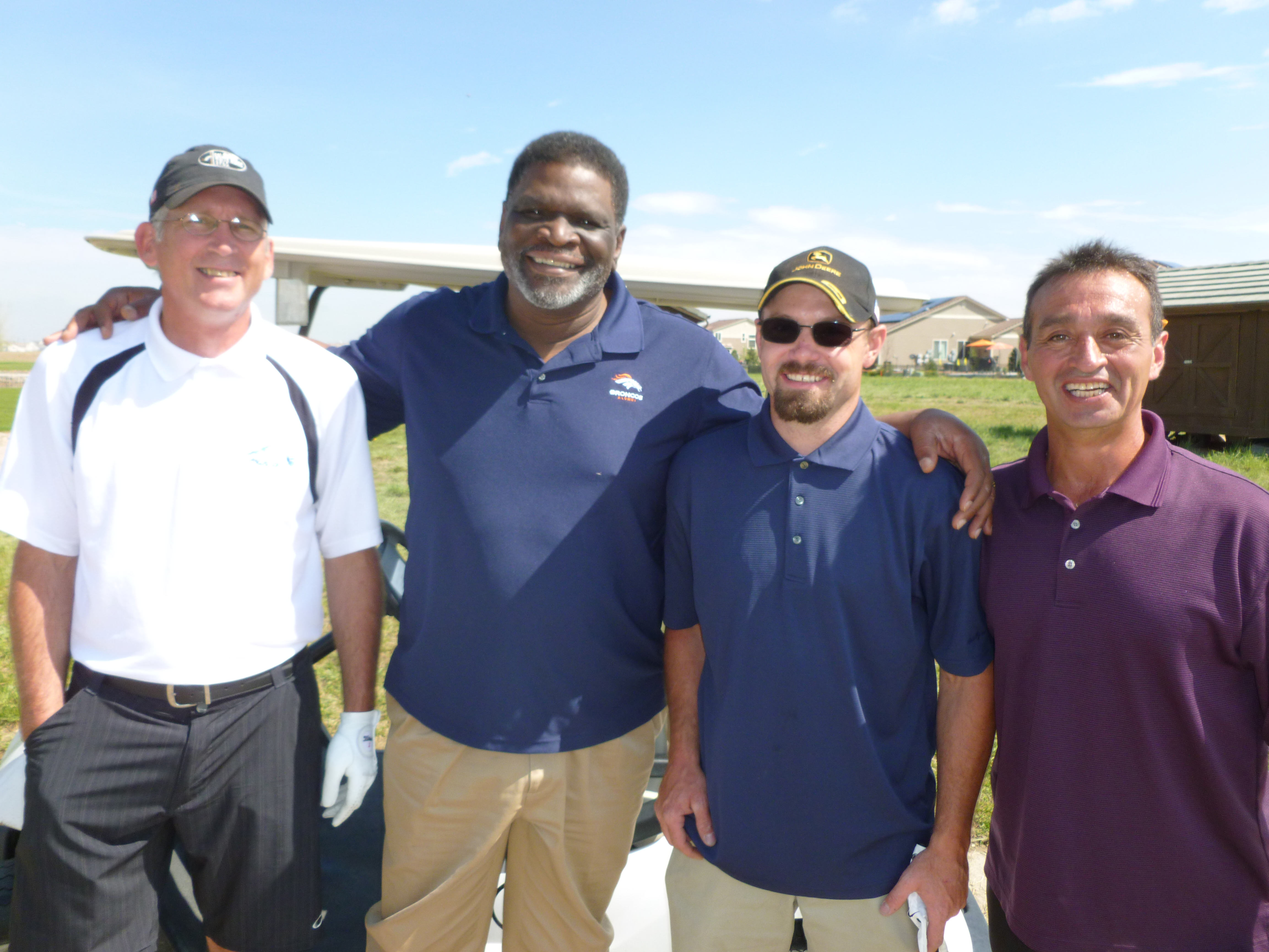 (l to r): Daniel Hedin, former Denver Broncos linebacker Tom Graham ...