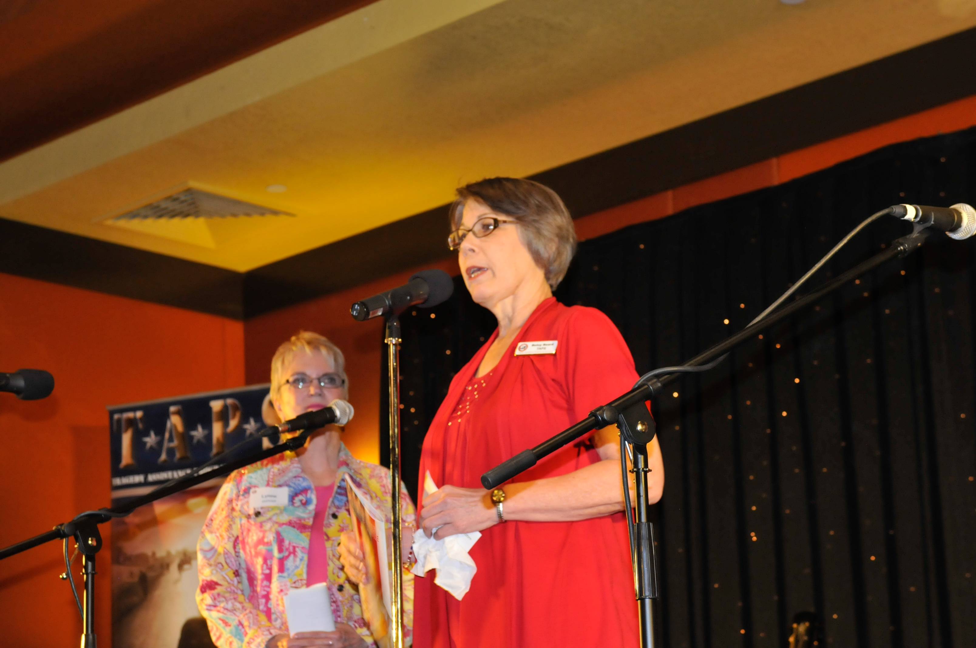 Lynne Cottrell listens to Betsy Beard talk about the journey that led ...