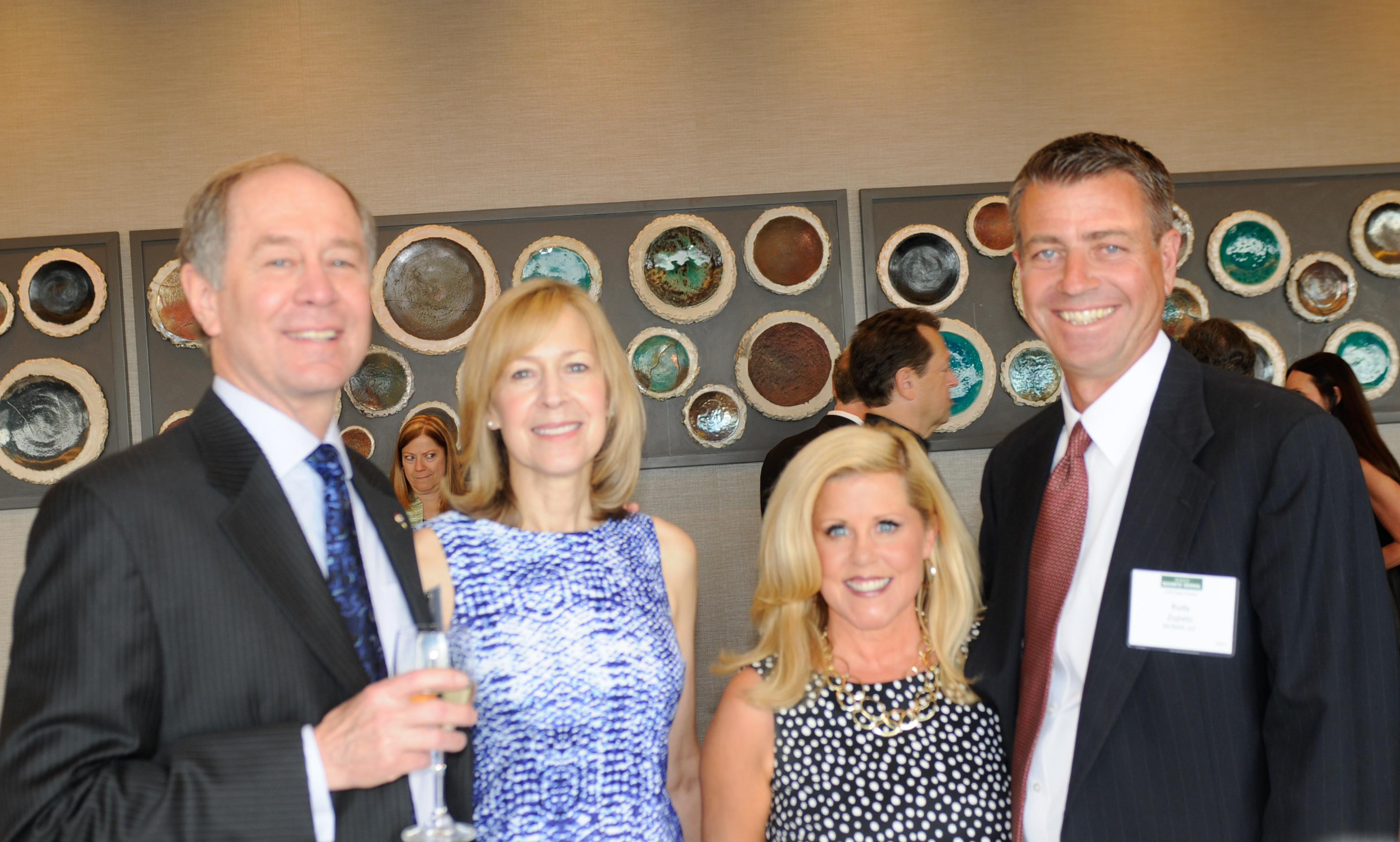 From RE/MAX: Shaun and Sarah White, left, with Rudy and Lisa Zupetz