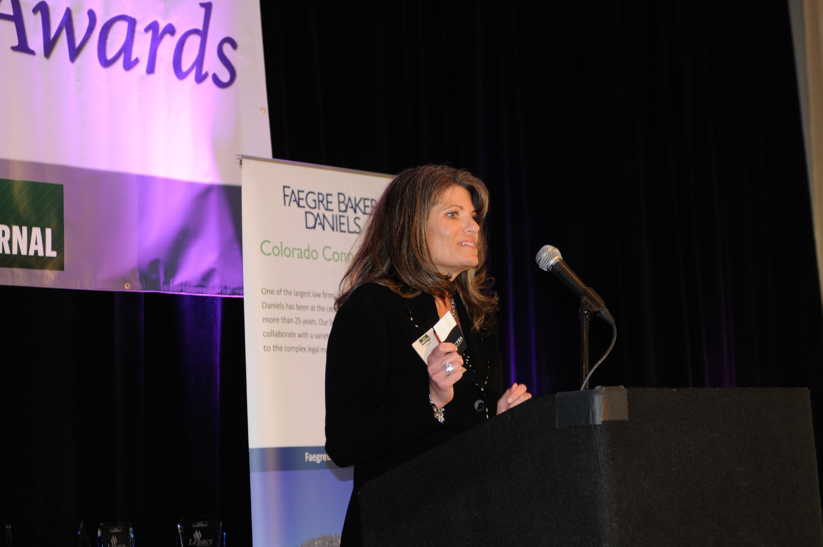 Janet Lowe of Vectra Wealth Management says a few words of welcome