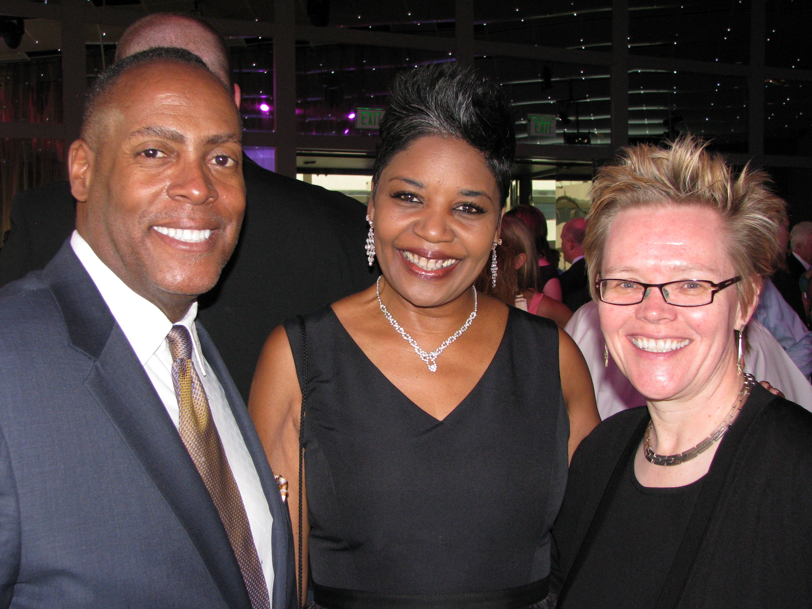 Morris Price, left, smiles with Nita Henry and Dr. Chris Nyquist
