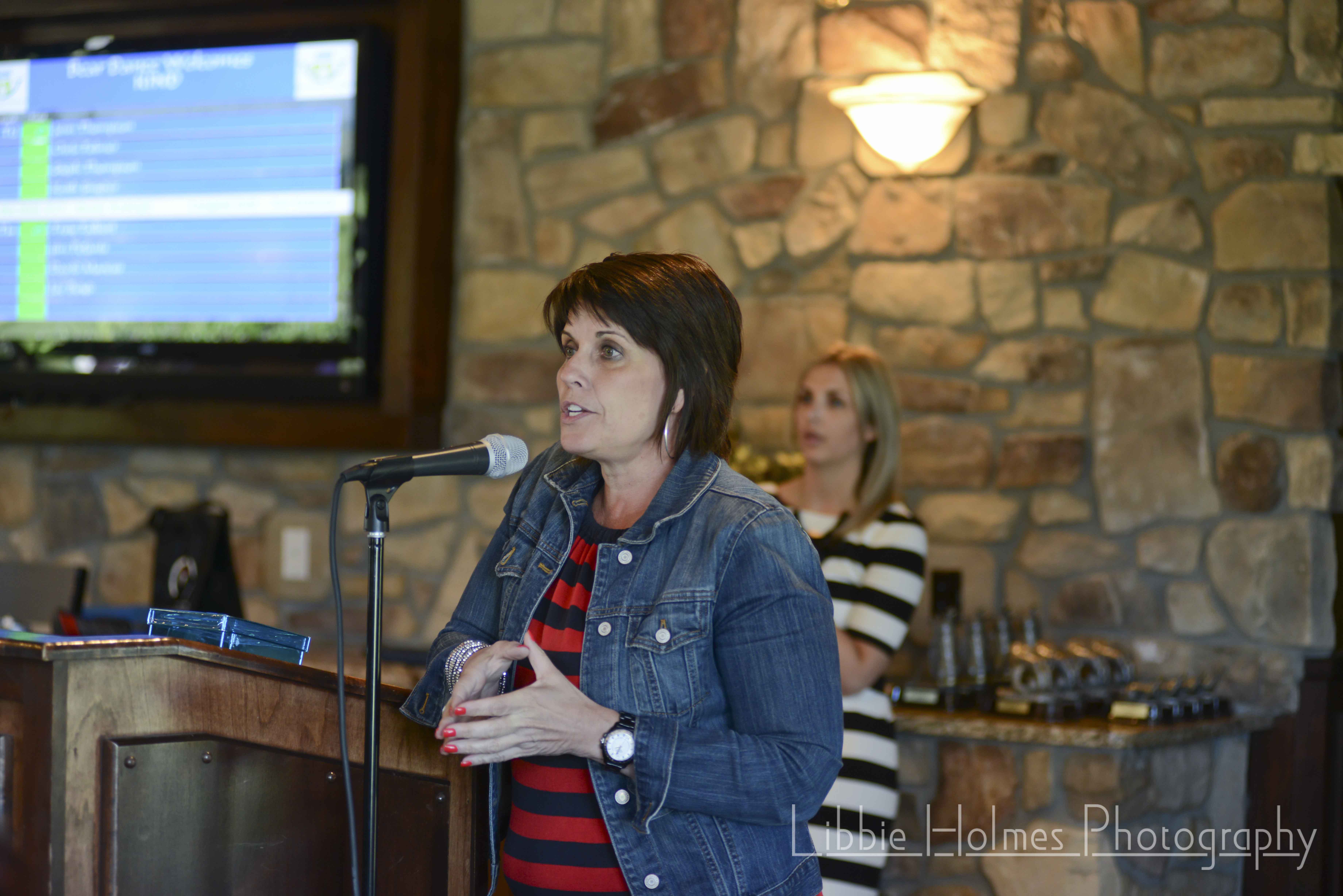 Executive Director Julie Collette welcomes the crowd