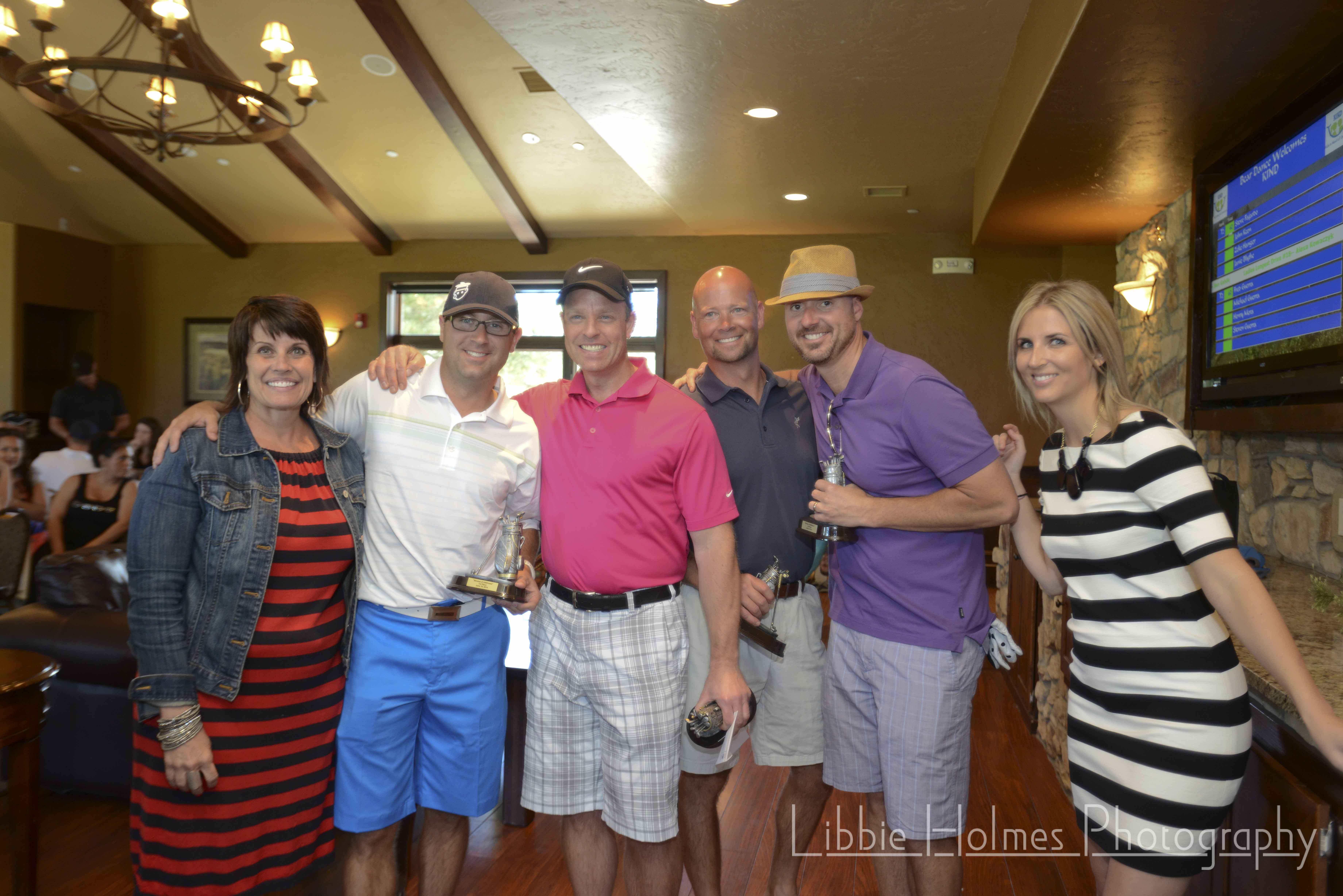 Executive Director Julie Collette, left, with the winning team of Rudy ...