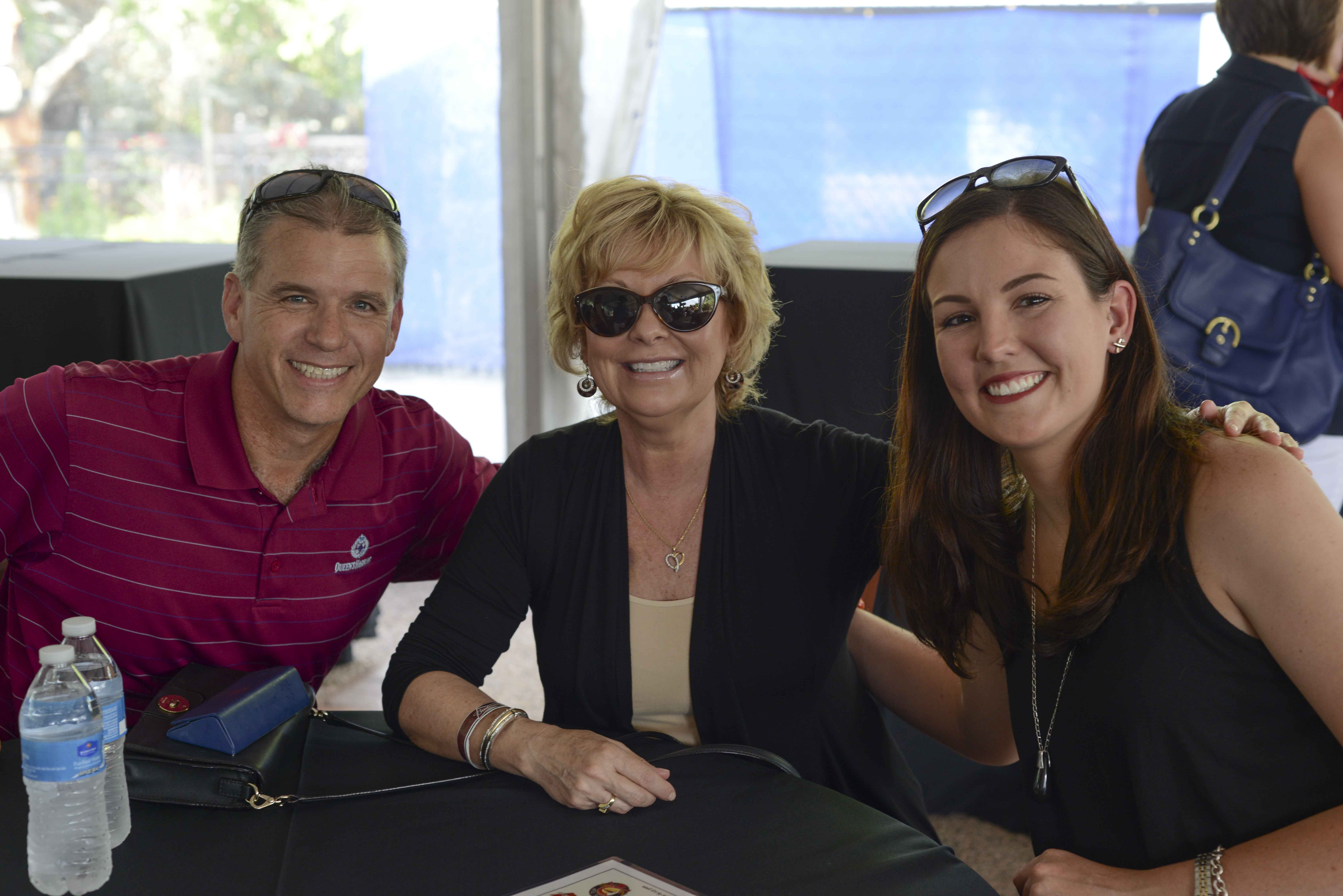 Matt and Annette Taylor, left, with Madelynn Reis