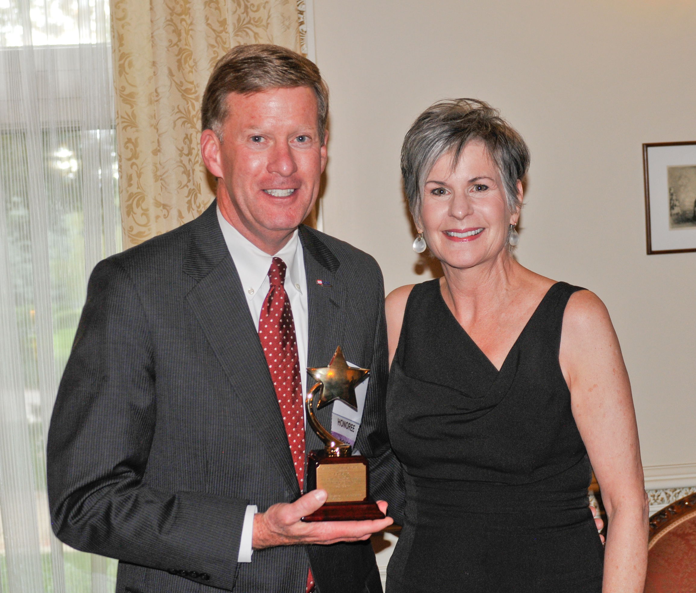 Tom Naughton of honoree US Bank with Trudy Strewler Hodges