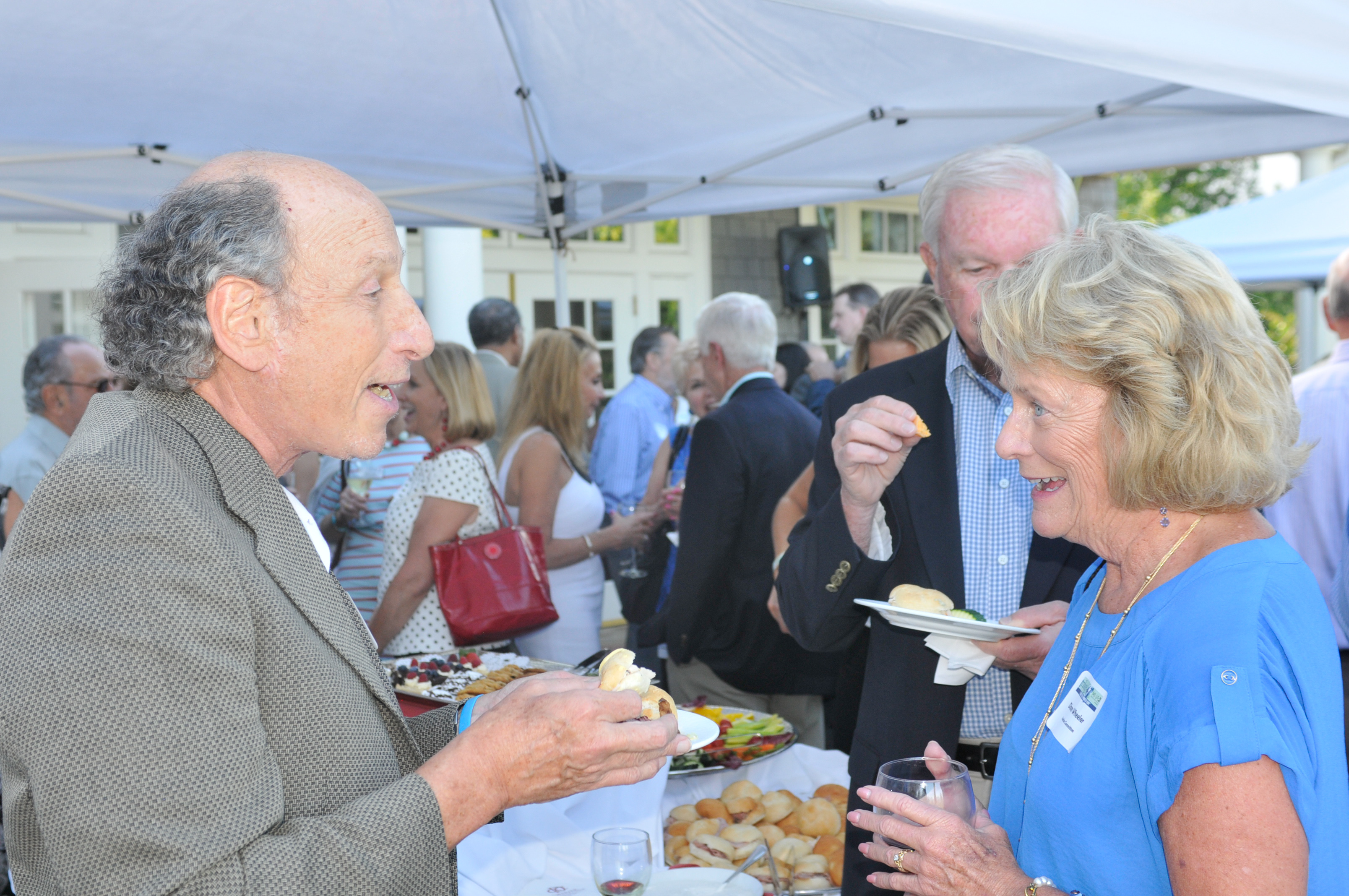 Honorary board member Dr. Bert Fermansky chats with Diane Wheeler
