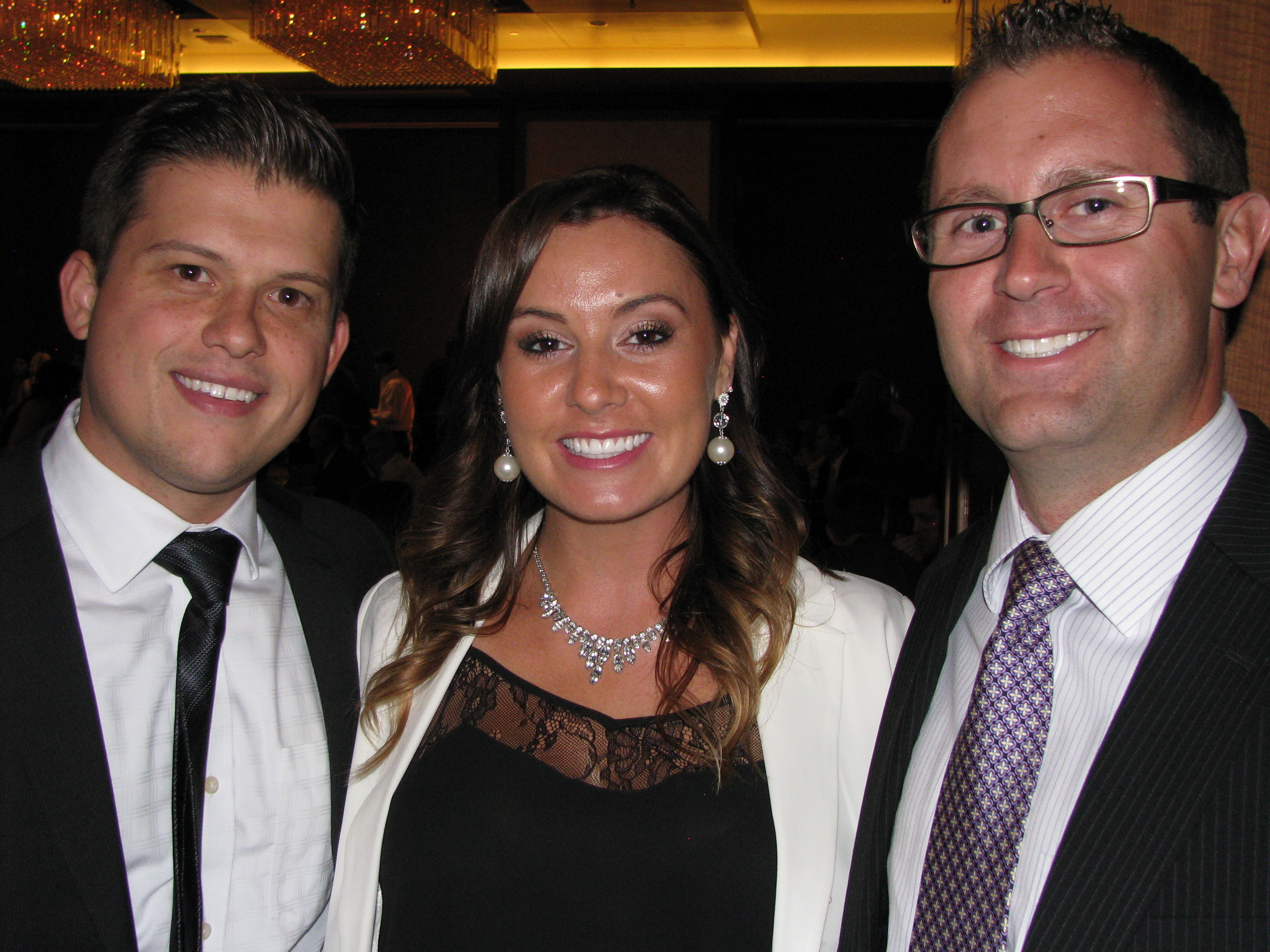 It's a fun night for Justin Fodor, left, Jenni Silva and Rudy Wolf