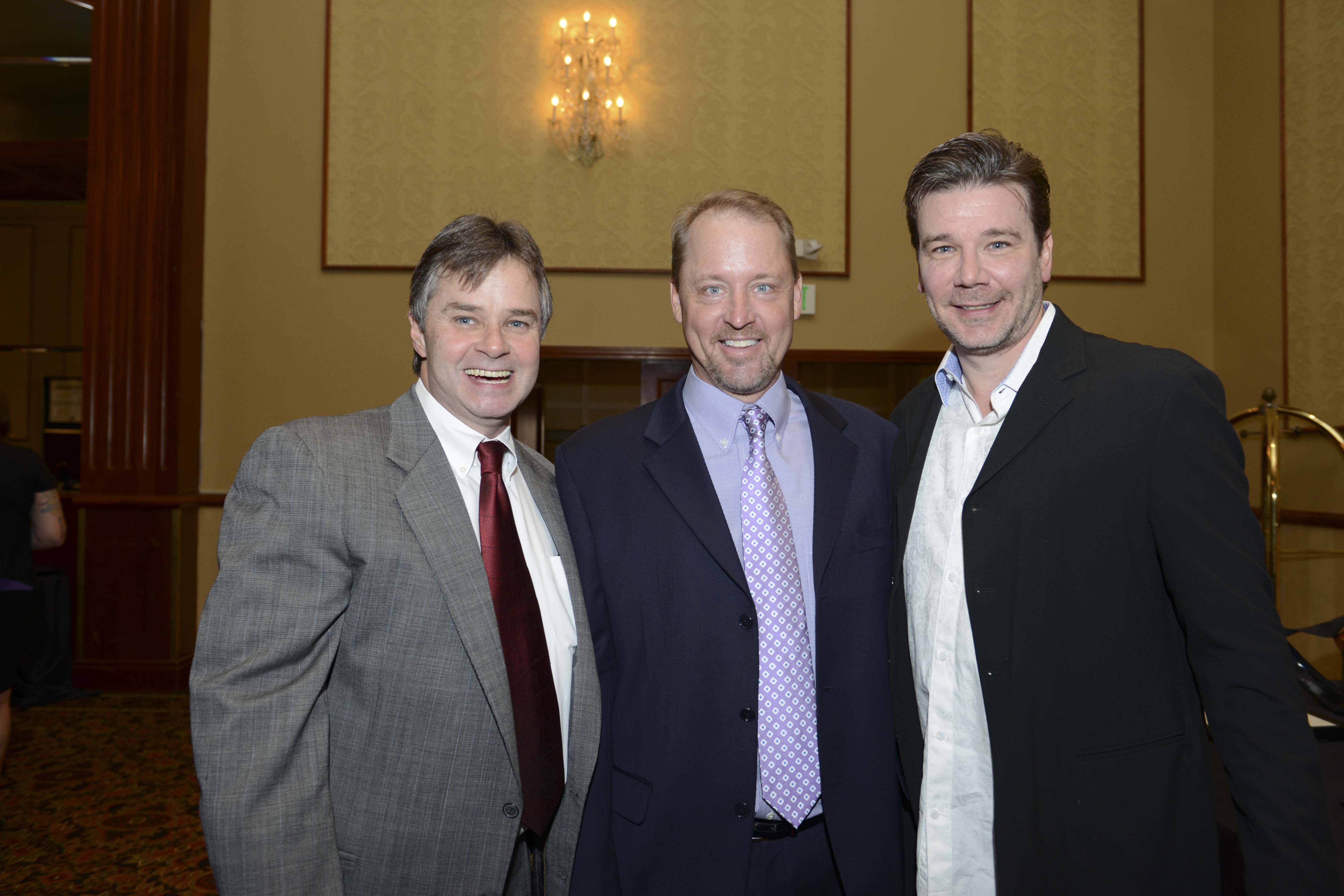 CEO Christopher Conway, left, with speaker Dr. Even Crist, and host Joe ...