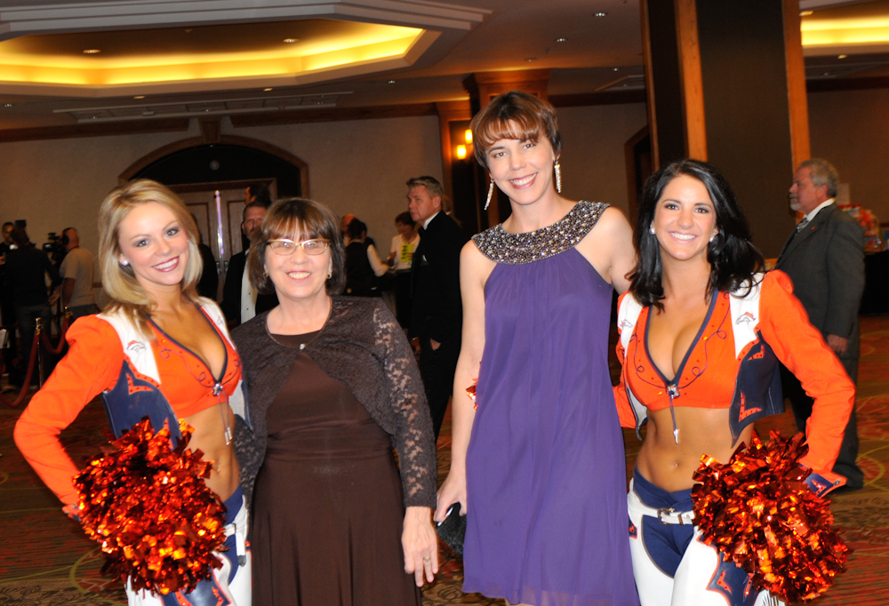 Broncos cheerleaders Ashley, left, and Angela (right) with Darcy Arnold ...