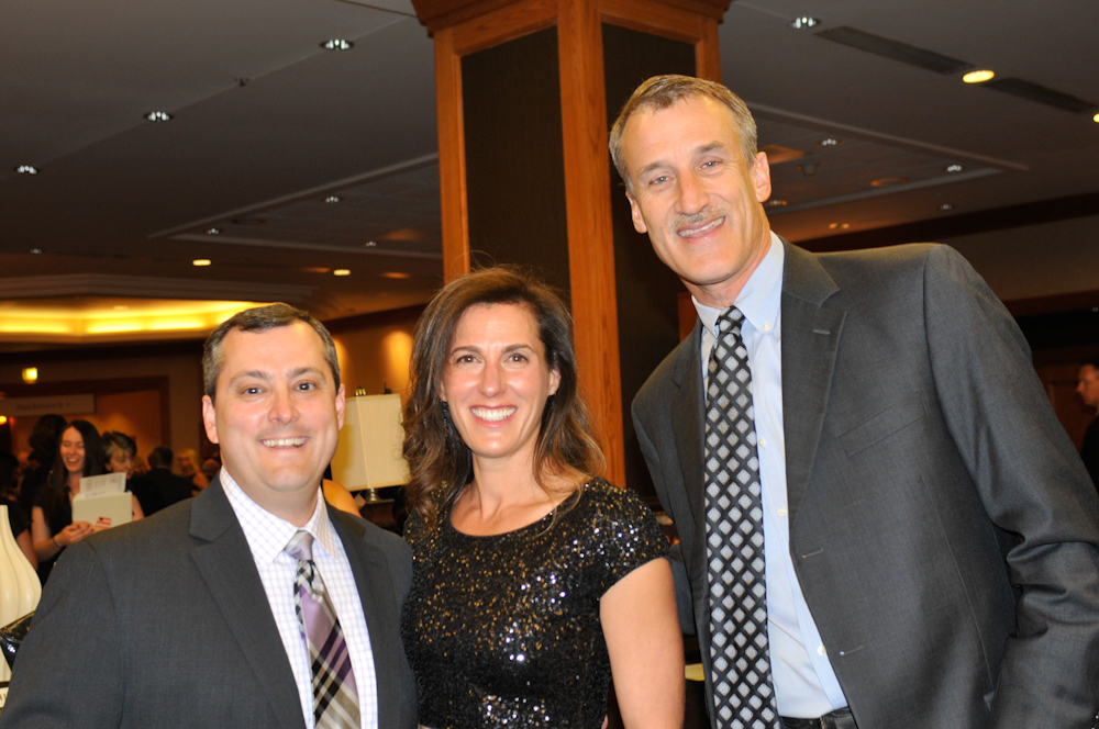 Dr. Jonathan and Joanne Sherman, left, with Bill Hanzlik