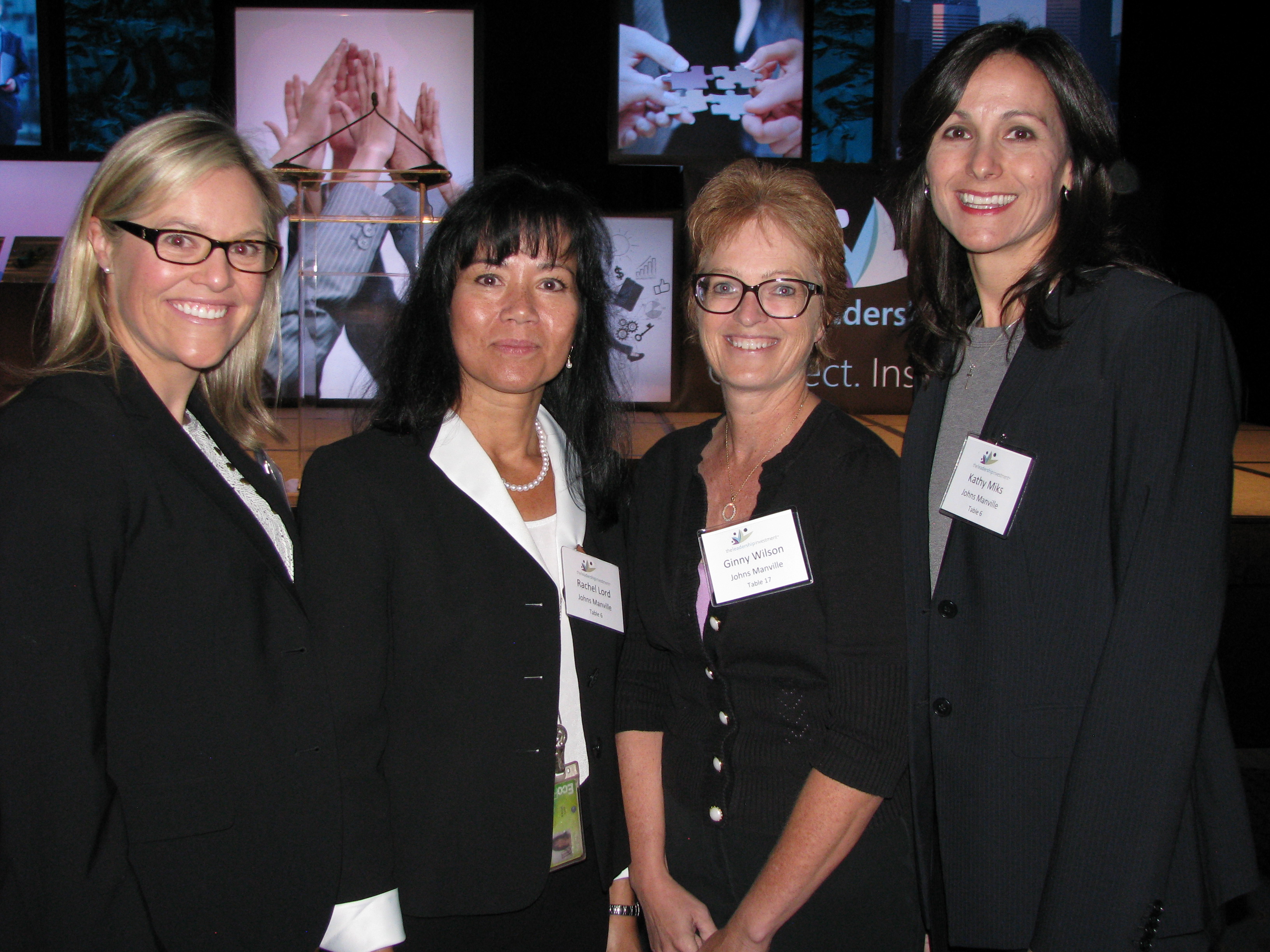Emily Gehrmann, left, smiles with Rachel Lord, Ginny Wilson and Kathy Miks