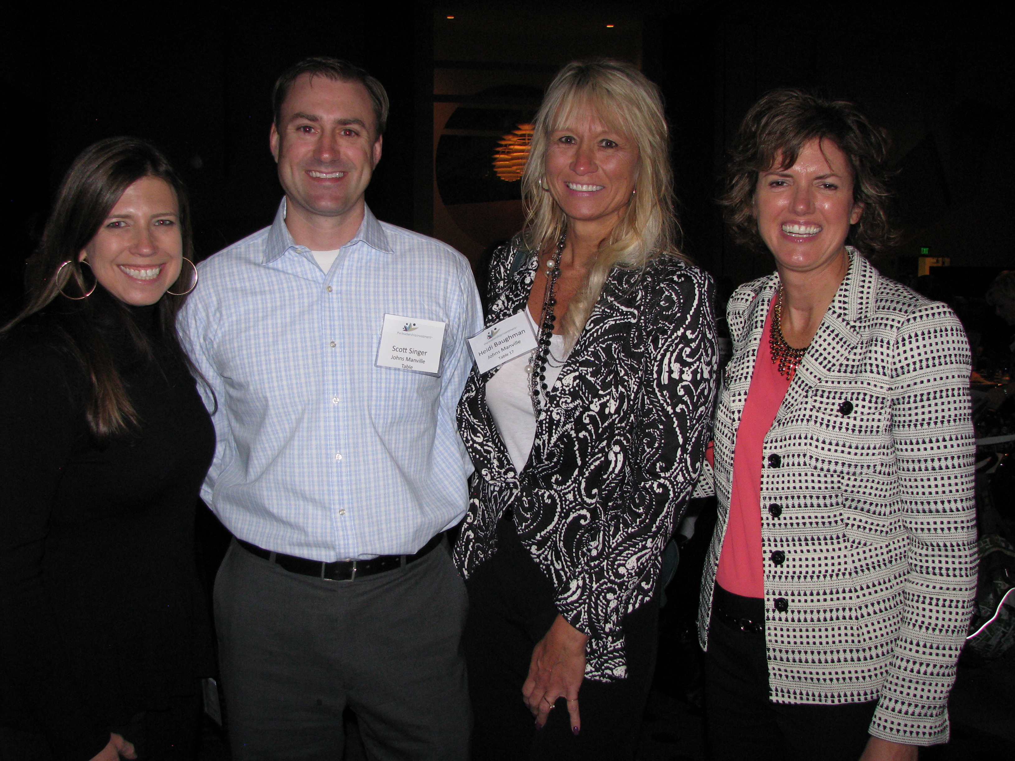 Kelly Neary, left, takes time for a photo wtih Scott Singer, Heidi ...