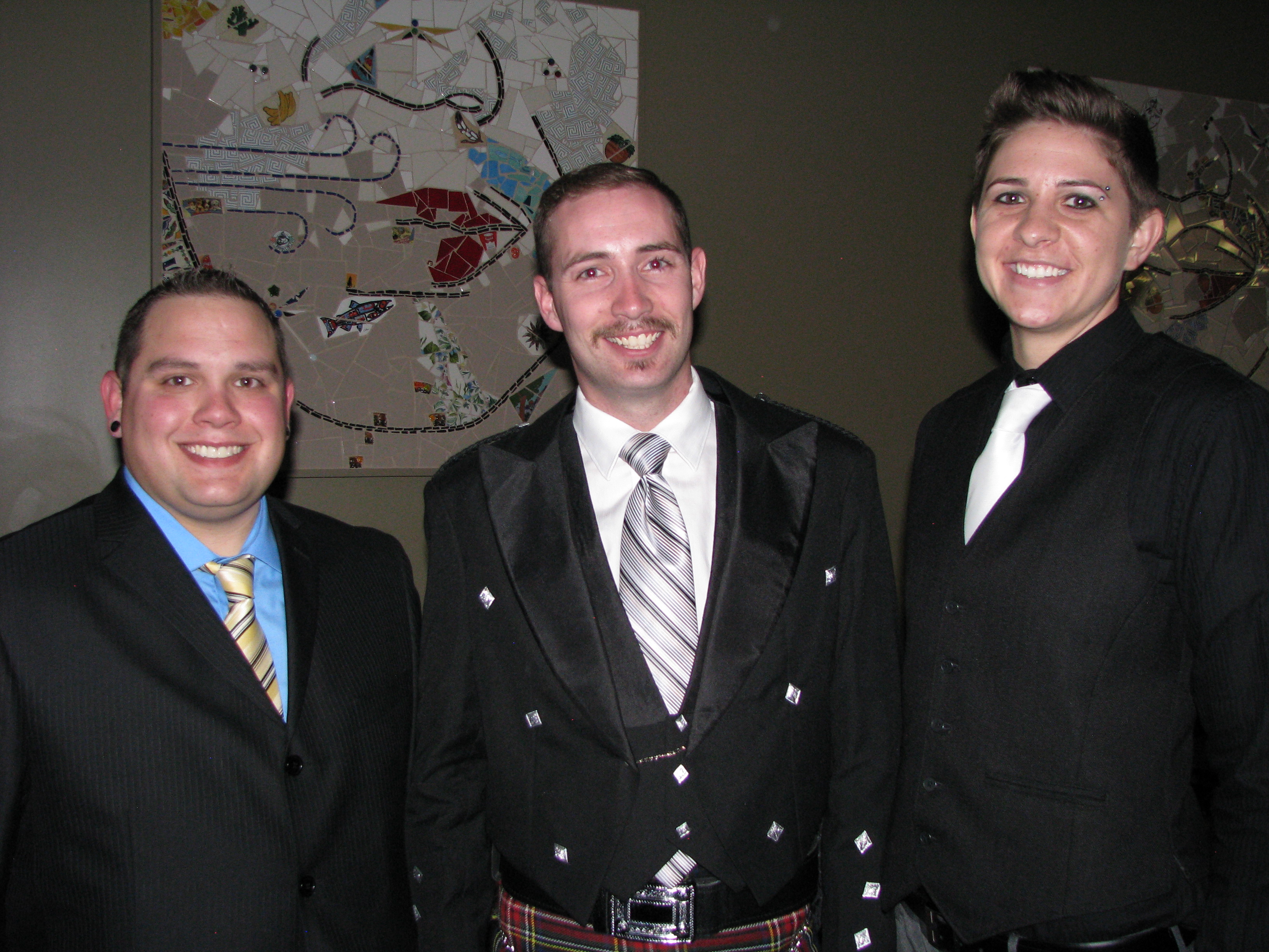 Warm smiles from Tony Galvin, left, Brian Ness and Alyssa McGuinnis