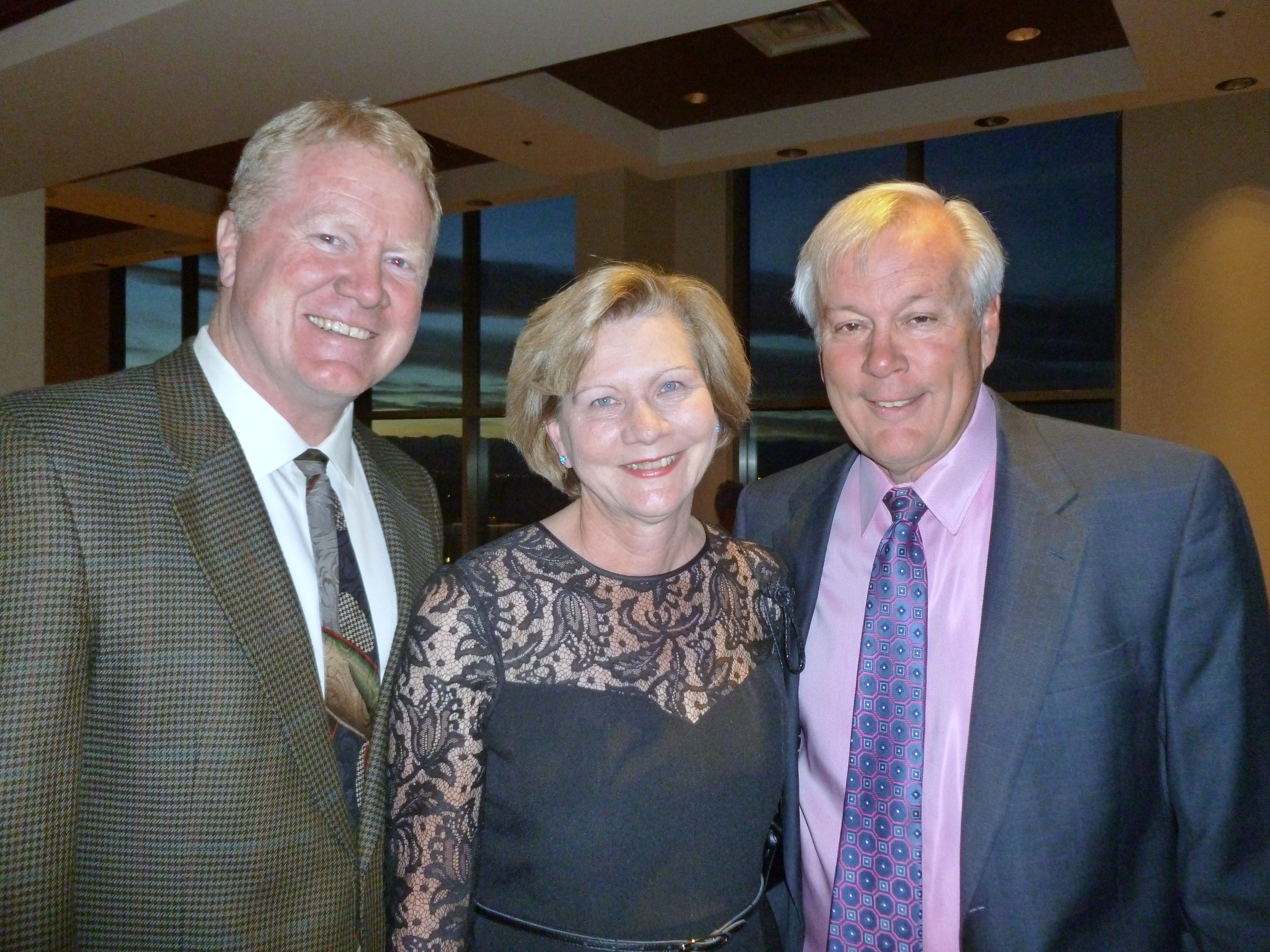 Former Denver Bronco Karl Mecklenburg (left) chats with Maureen and ...