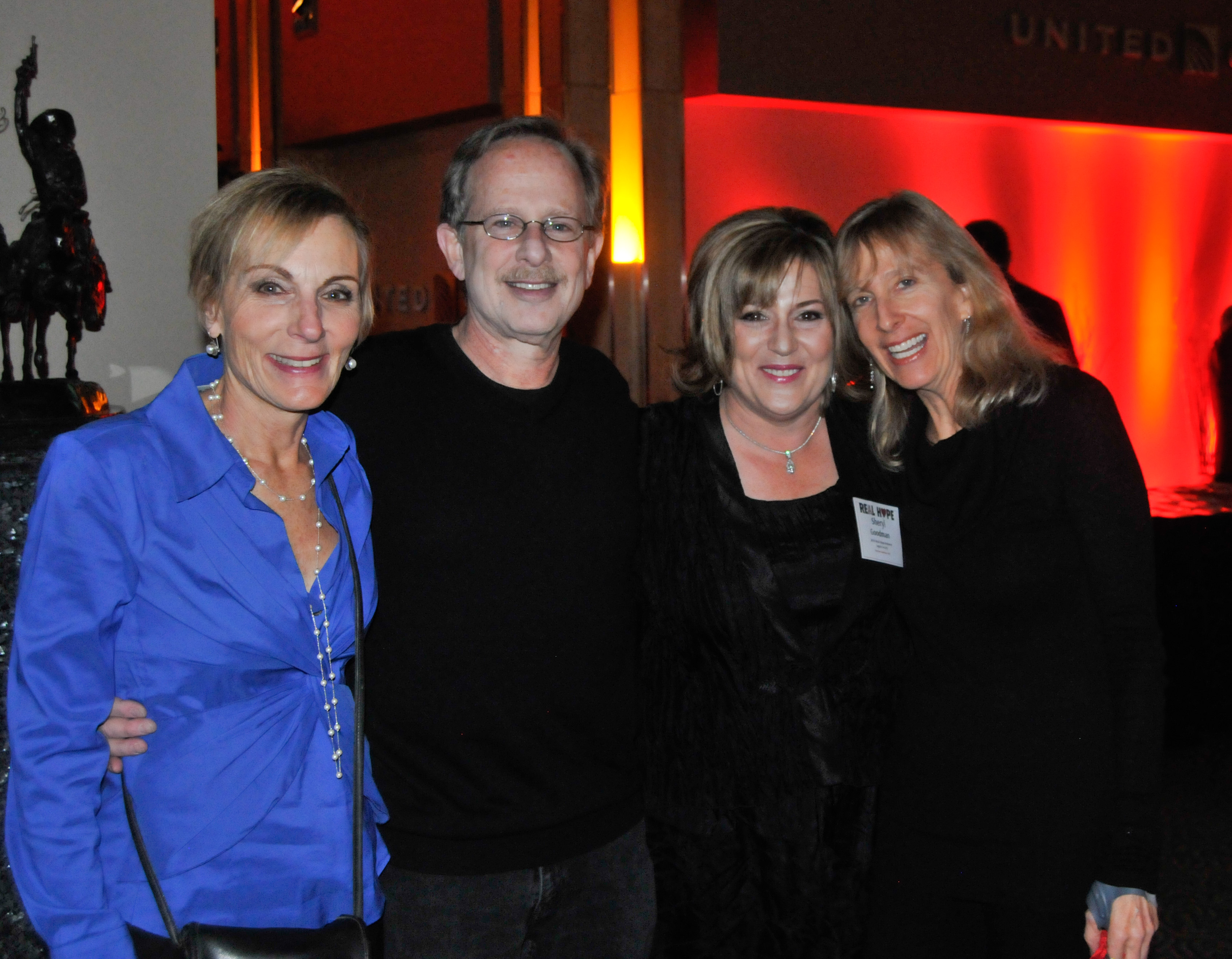 Evan Zuckerman, left, Andy Bernstein, honoree Sheryl Goodman and Beth Brody