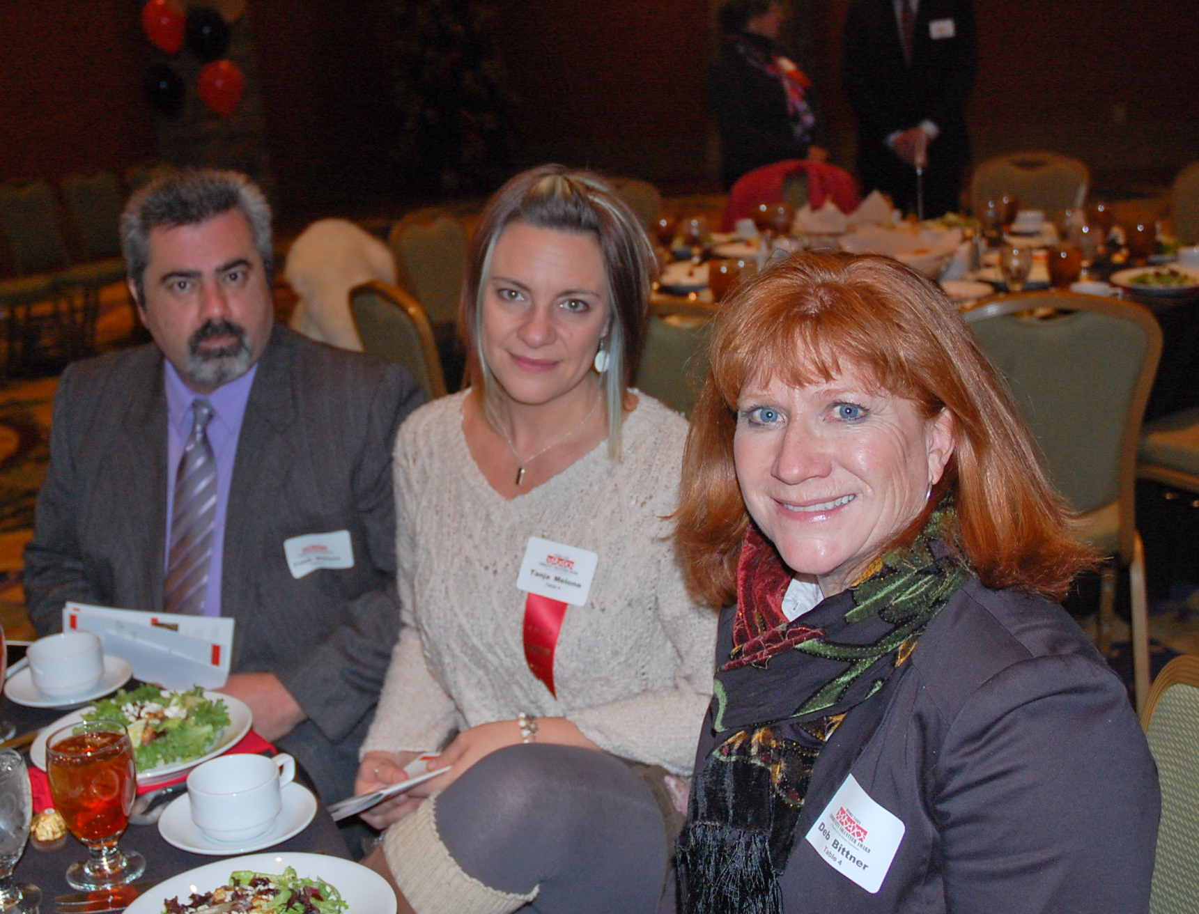 Frank Melone, left, honoree Tanja Butler-Melone and Deb Bittner