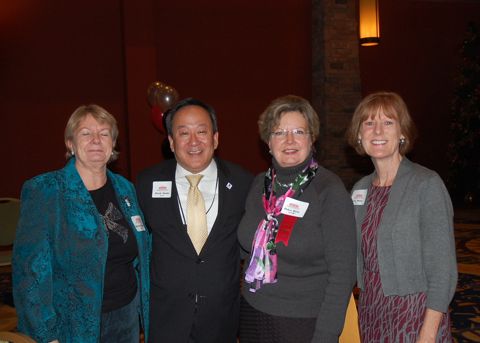 Donna Gordon, left, Derek Okubo, honoree Deb Wells and Tina Wells