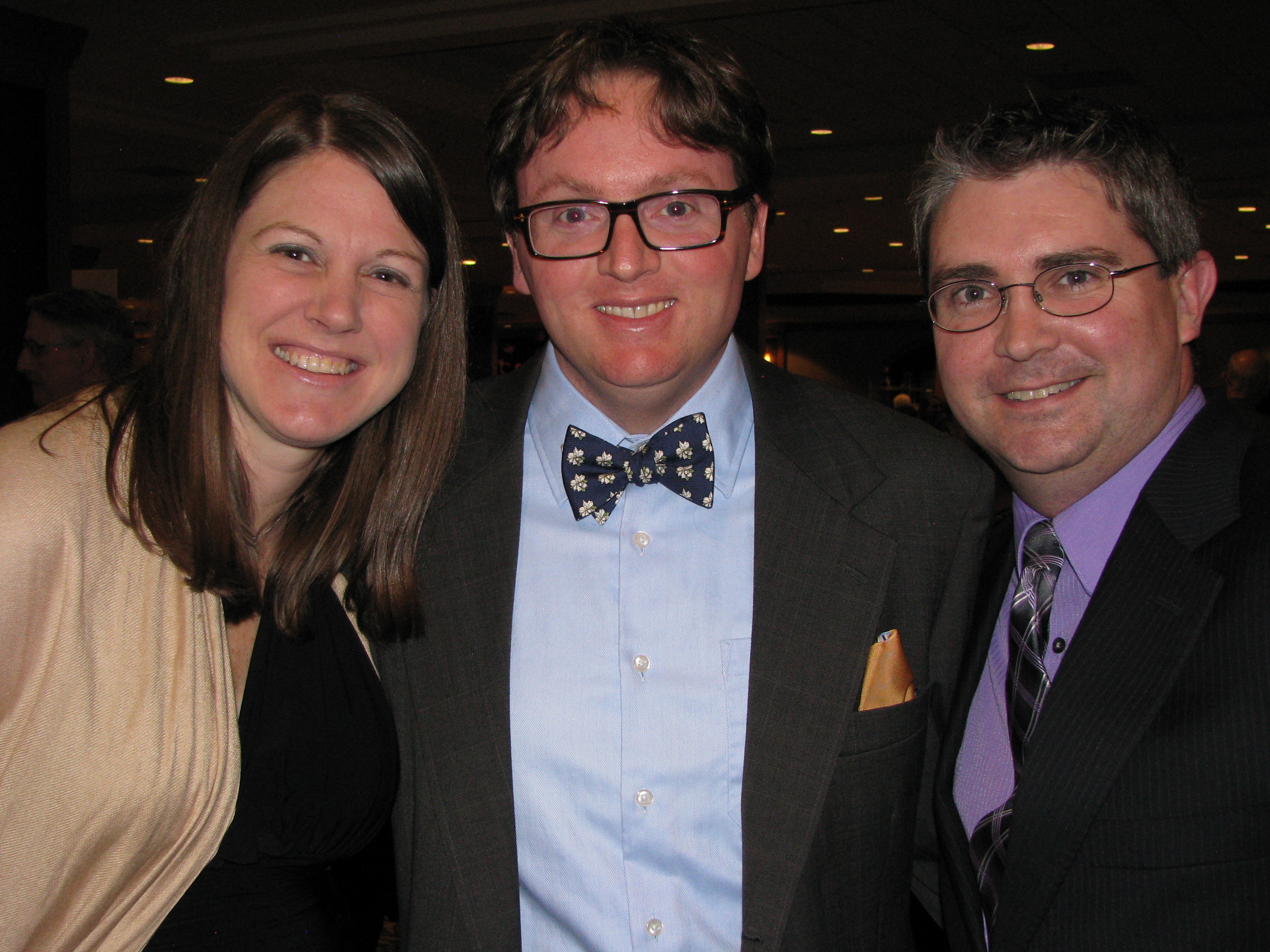 Rachel Klos, smiles wiht Jeff Klos and Ryan Sandusky