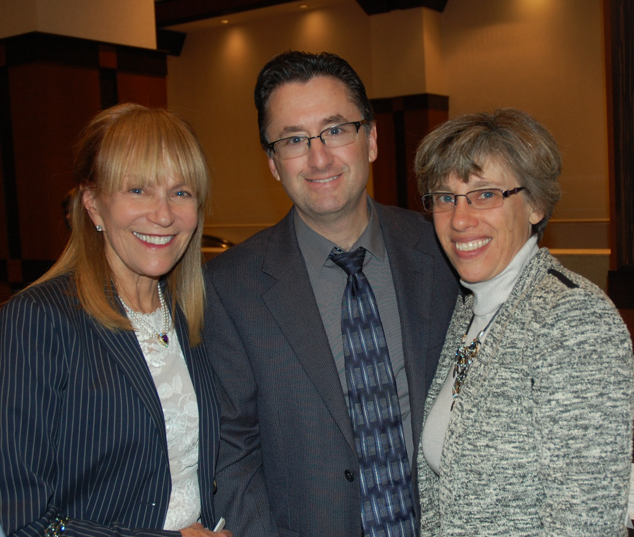 Evi Makovsky, left, and Rabbi Bruce Dollin, Tamra Dollin