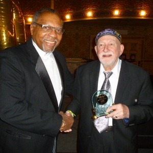 Charles Bloom accepts one of the evening's awards for the United ...